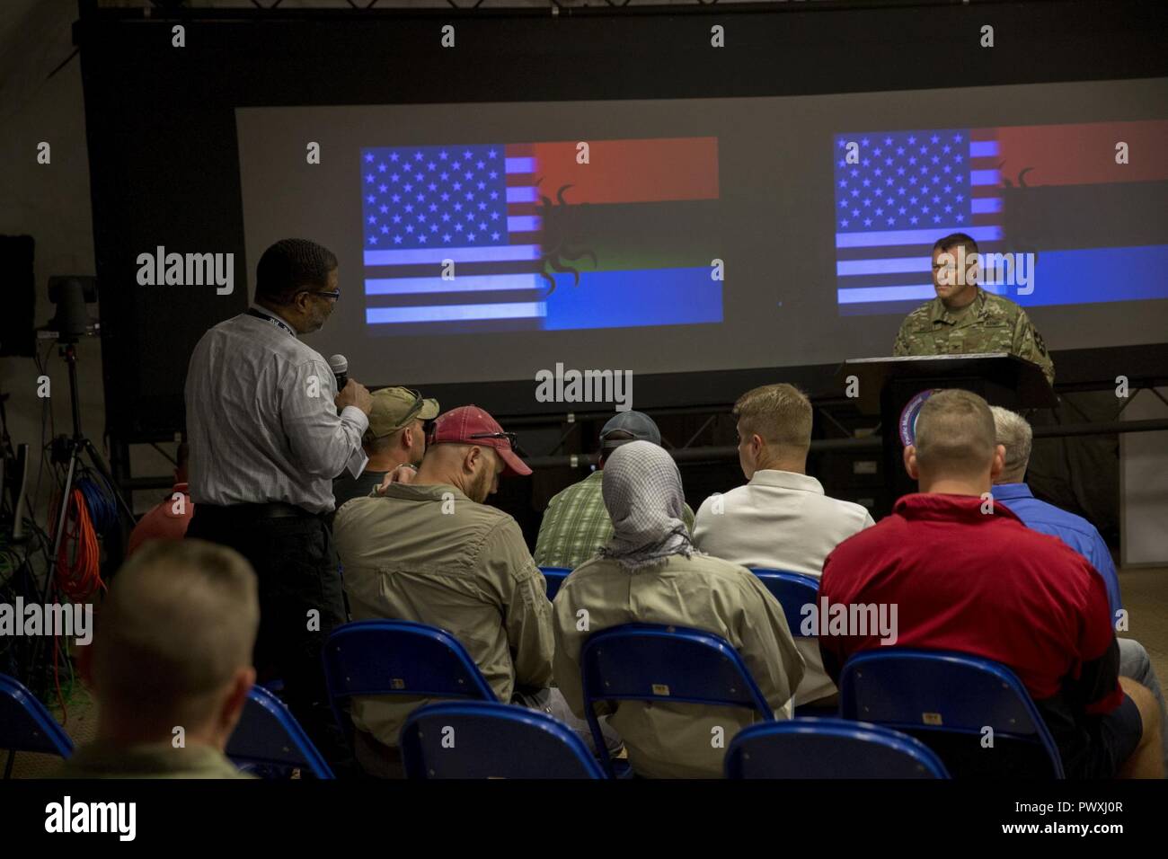 A mock media asks a question of U.S. Army Col. Jay Miseli 2-2 Stryker ...