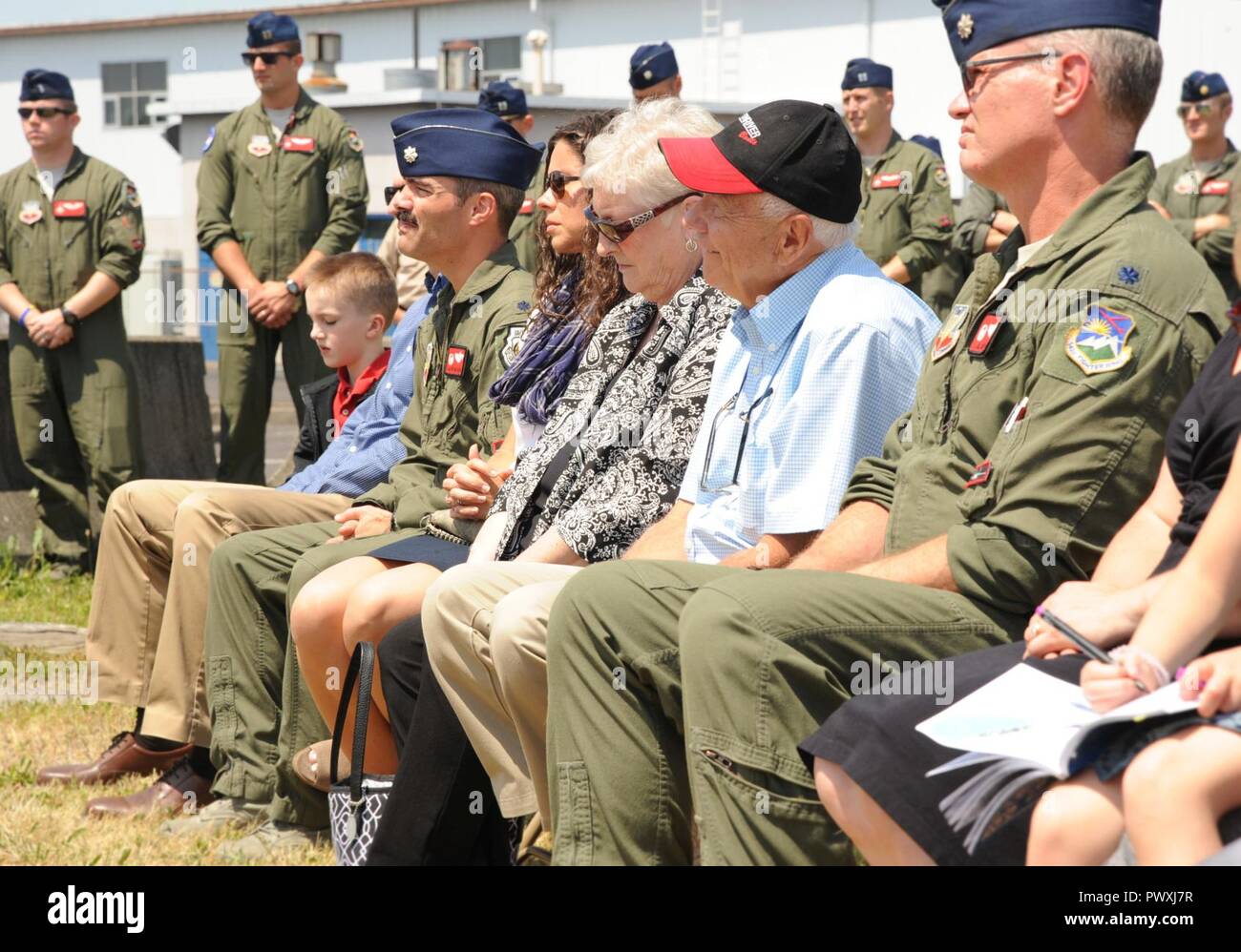 Family and friends of Maj. Gregory 'Grumpy' Young listen to remarks by ...