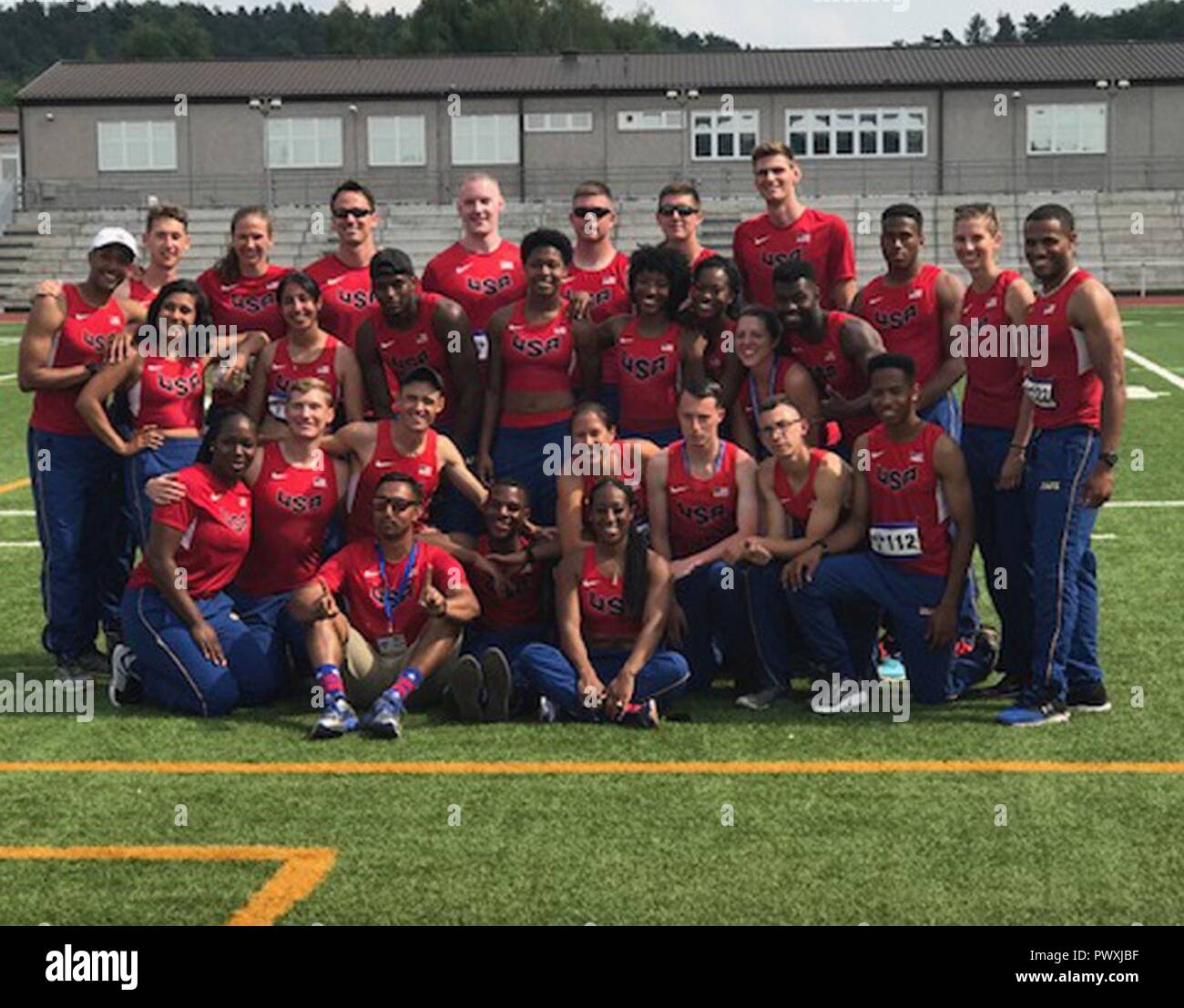 Master Sgt. LaTisha Moulds (center) won the 100-meter dash and the long ...