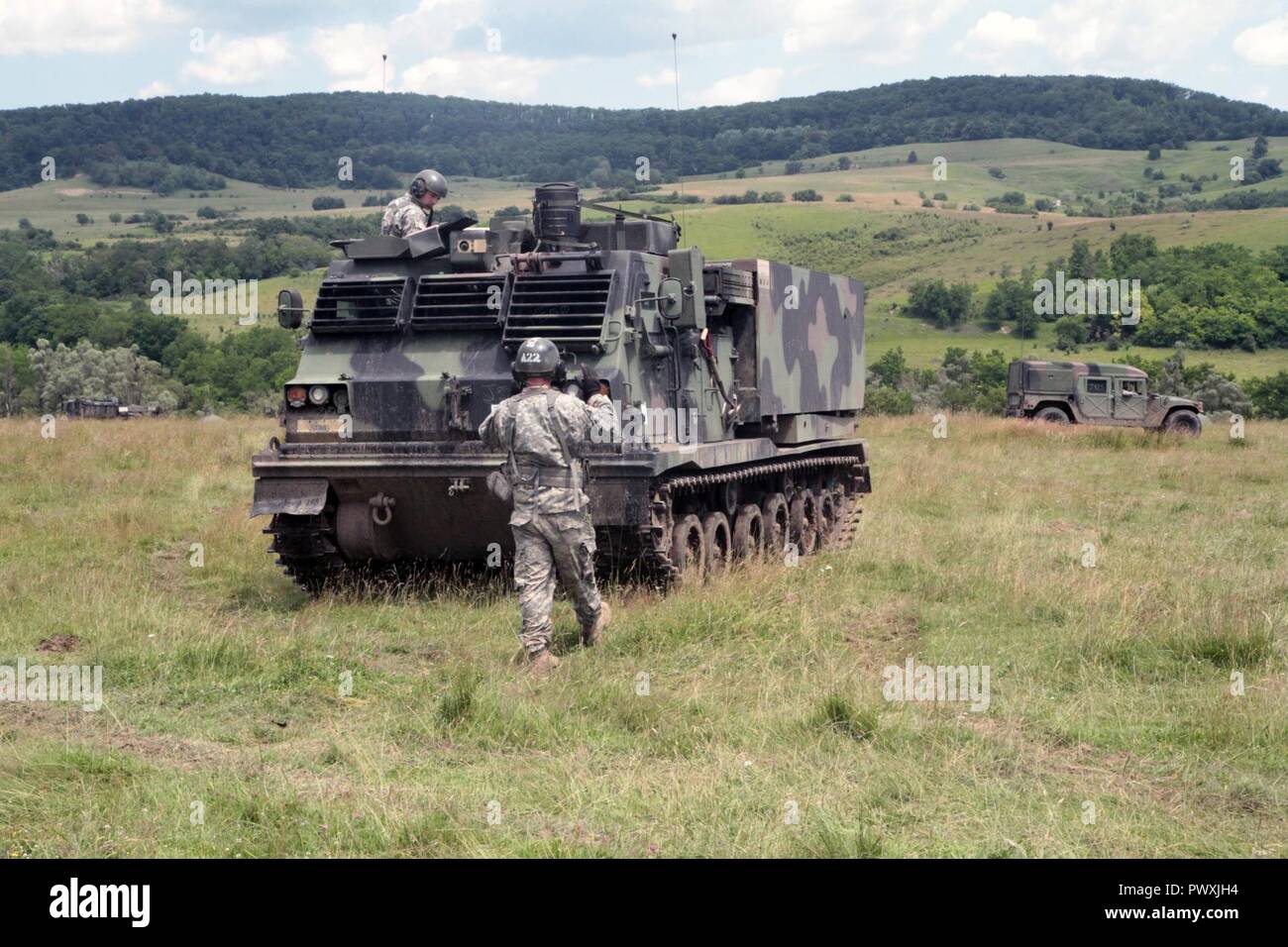 Male and female Soldiers from Alpha Battery, 1/147th Field Artillery ...