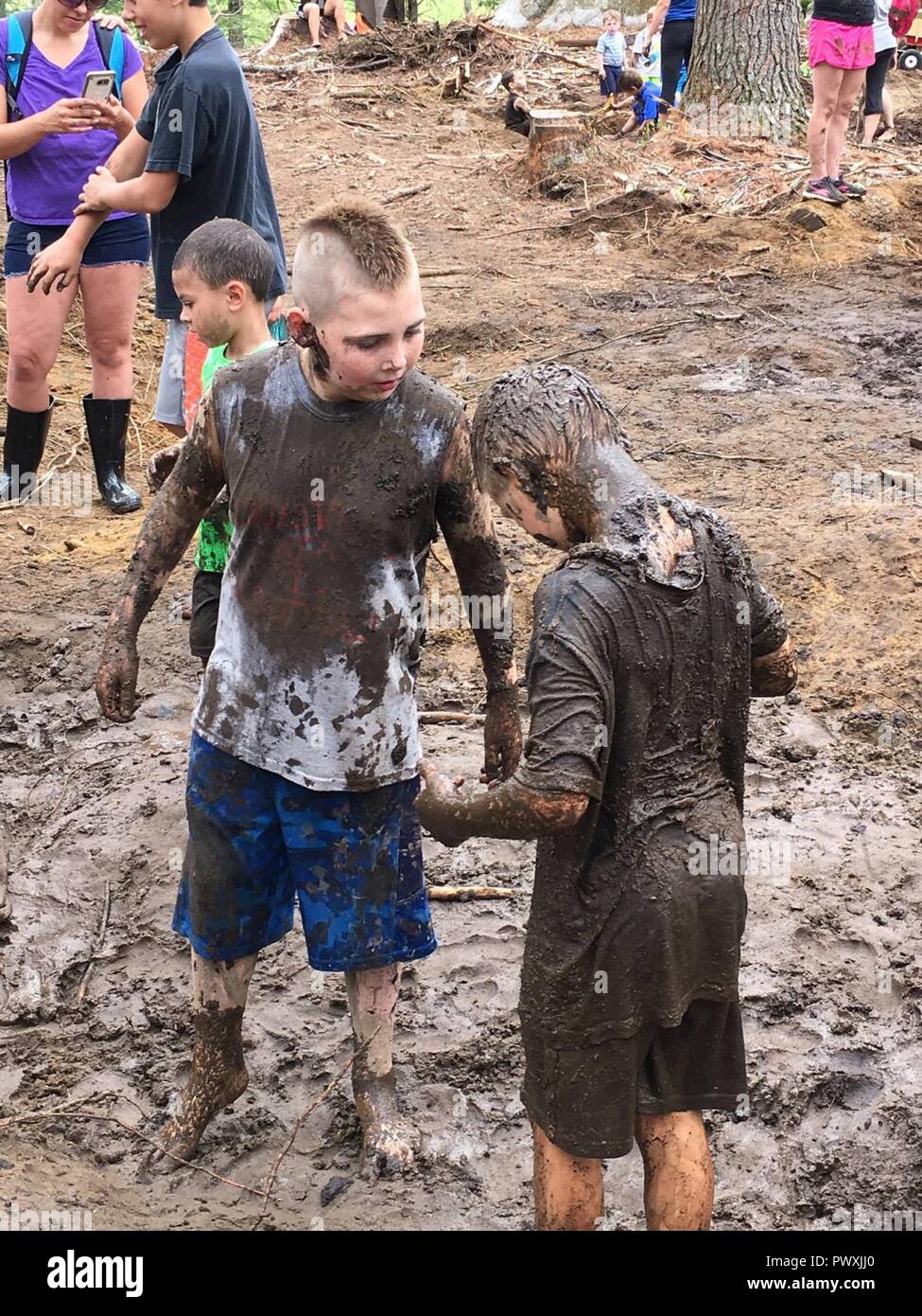 Children smear each other in mud Stock Photo - Alamy