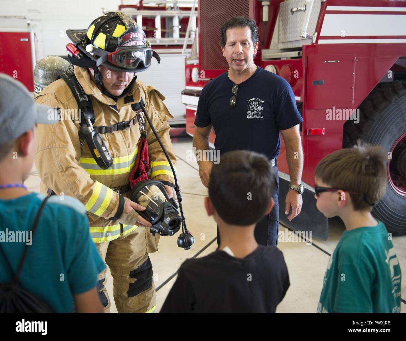 Jeffery Pardo (left), 502nd Civil Engineering Squadron firefighter ...
