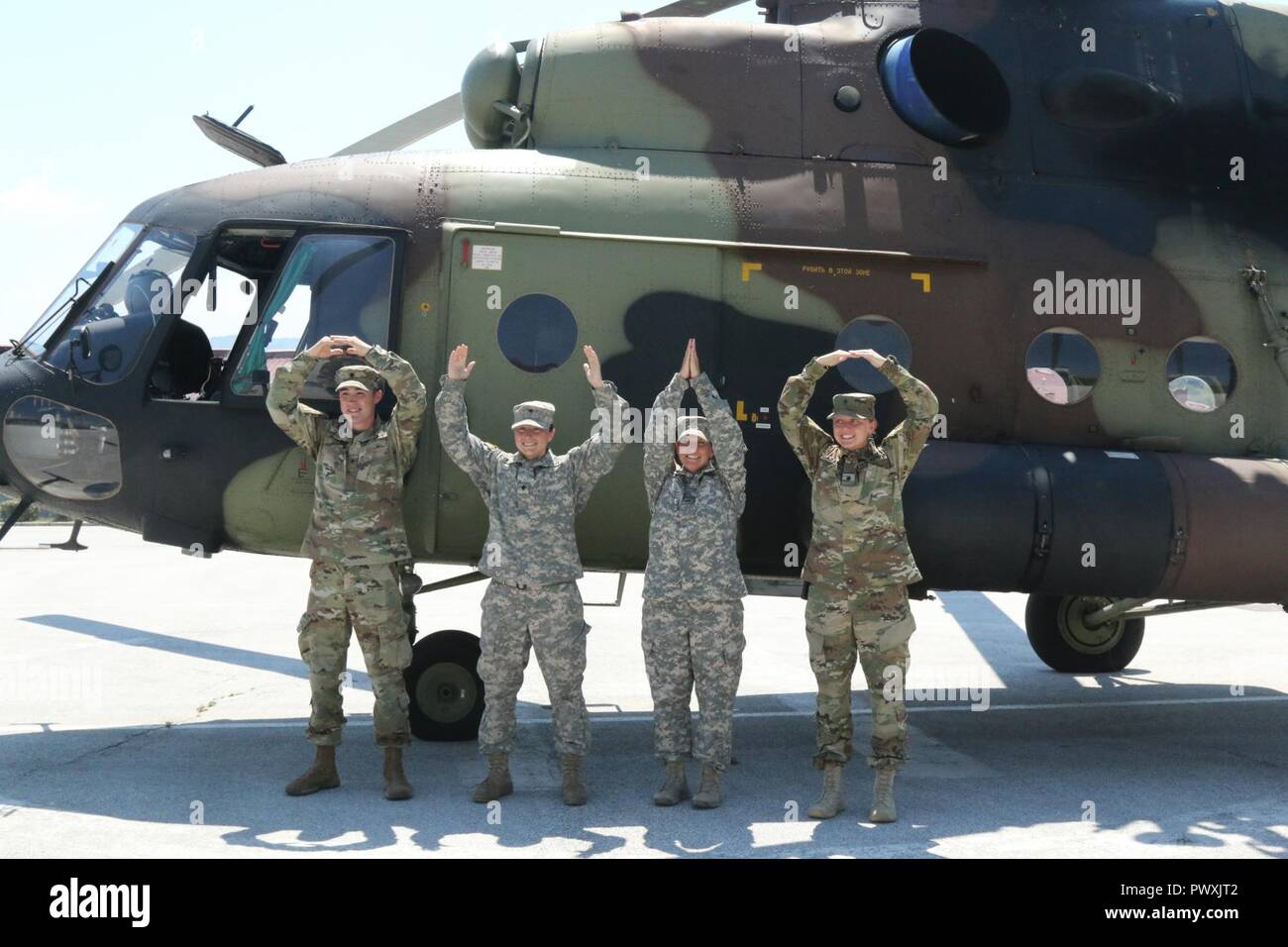 Army Spc. Matthew Crawford (left), currently deployed to Kosovo with ...