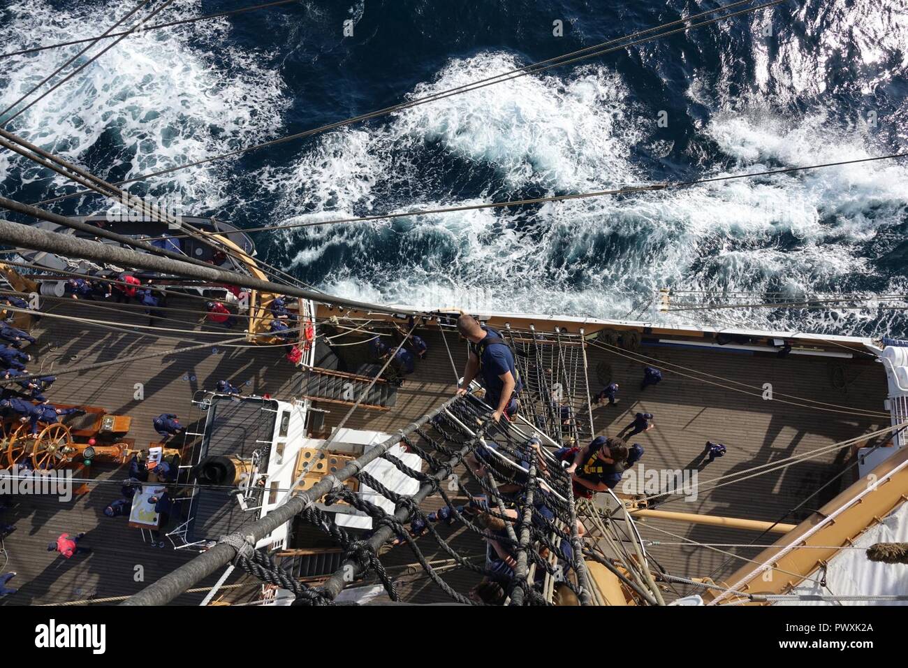 Crewmembers aboard the Coast Guard Cutter Barque Eagle, homeported in ...