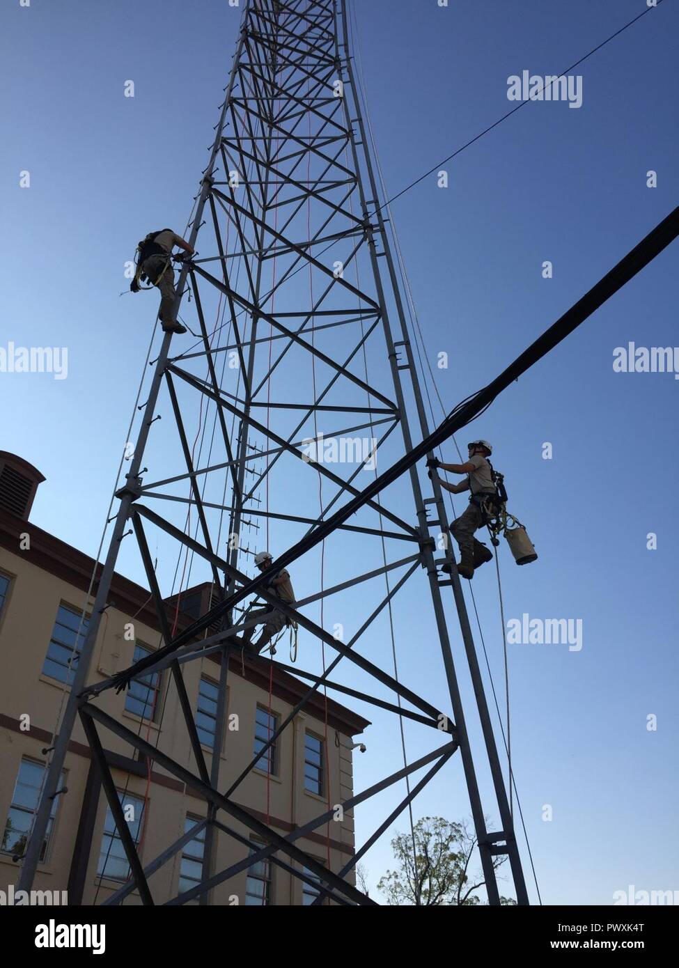 Airmen assigned to the 2nd Communication Squadron cable and antenna ...