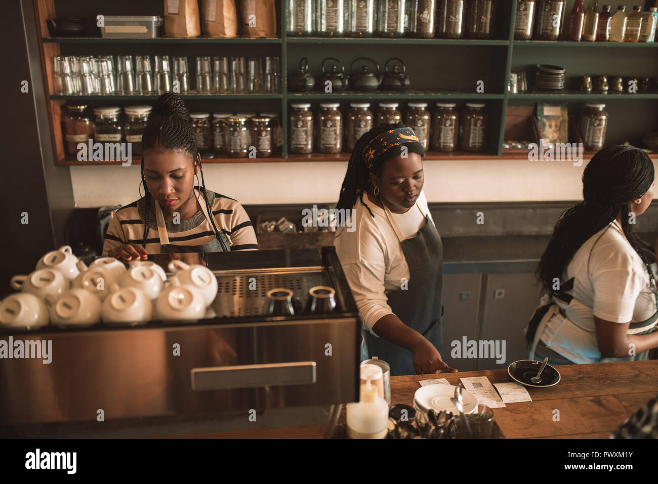 Behind counter coffee shop hi-res stock photography and images - Alamy