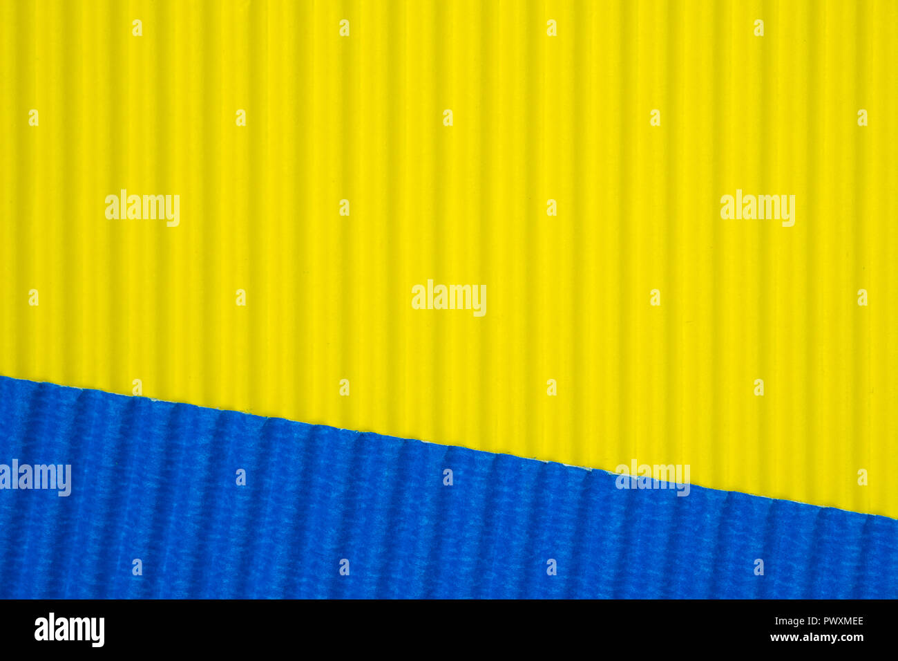 Blue and yellow corrugated paper texture, use for background. vivid ...