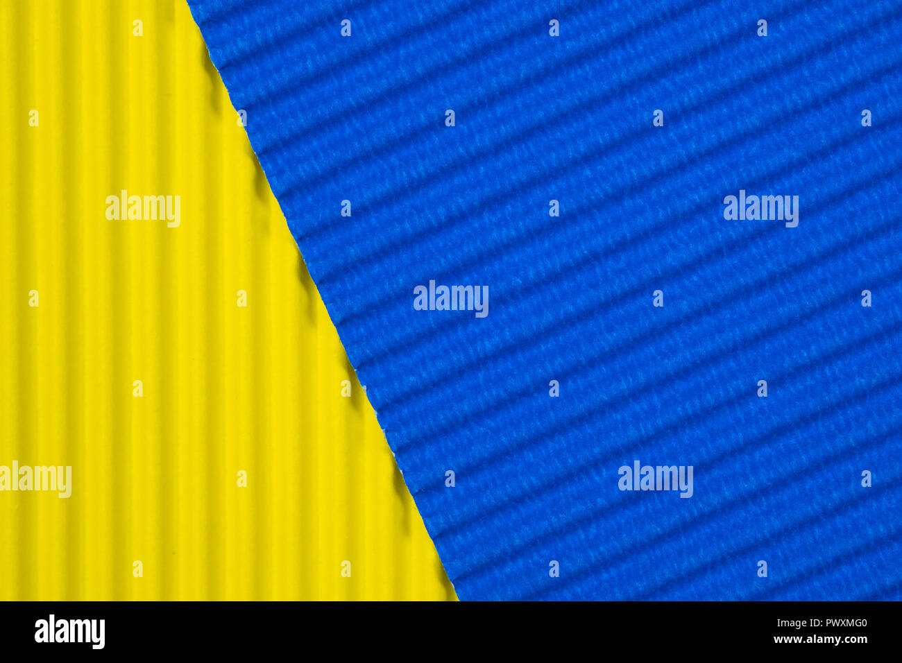 Blue and yellow corrugated paper texture, use for background. vivid ...