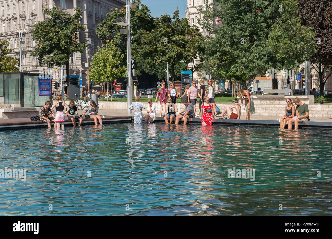 Budapest, Hungary - 7 august 2018: undefined people sitting on fountain ...