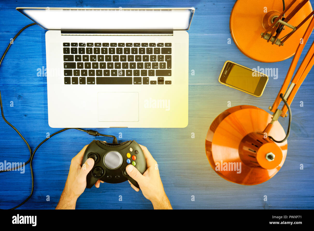 aerial view of a game station in a colored desk Stock Photo - Alamy