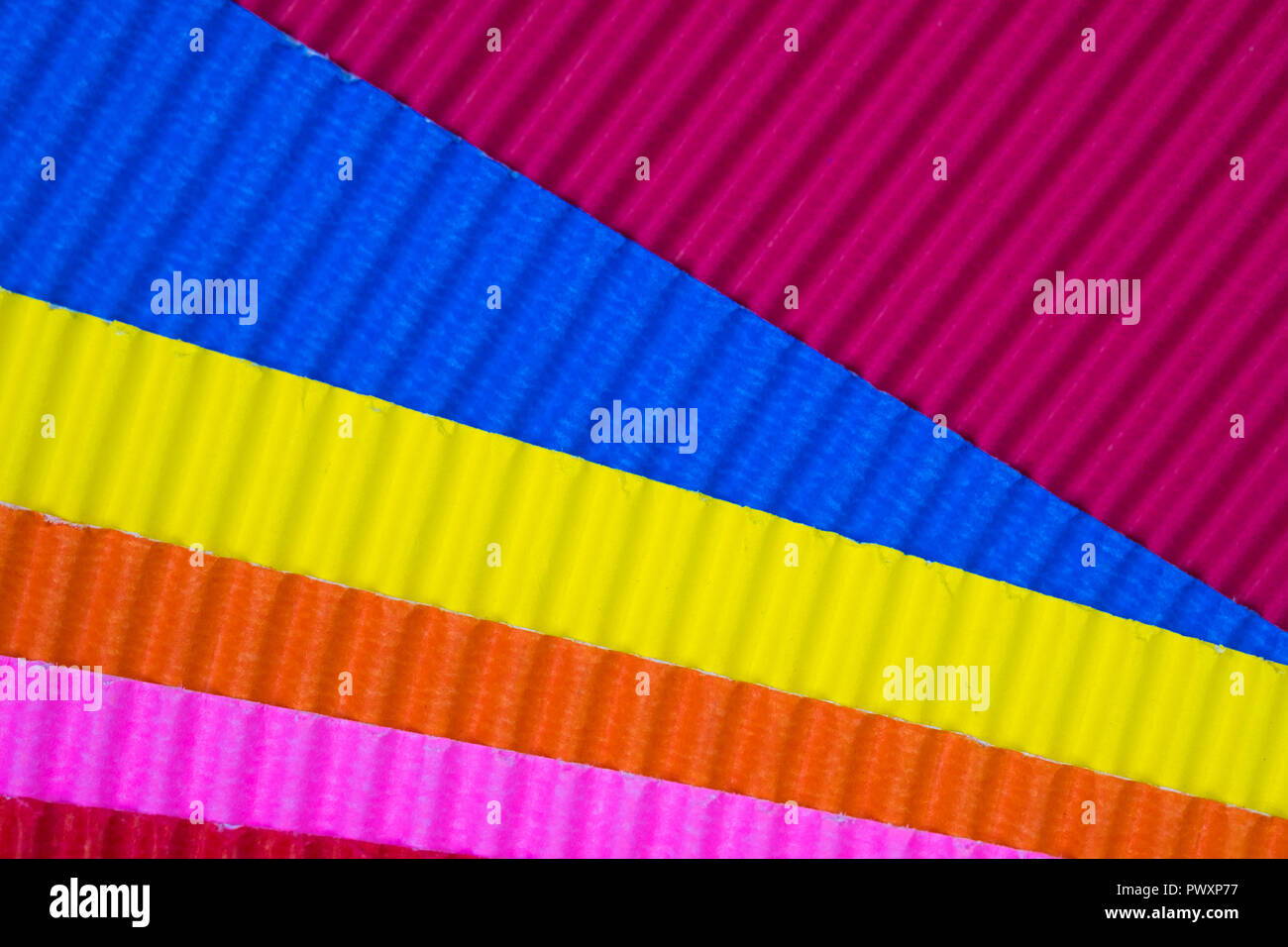 Multi coloured corrugated paper texture, use for background. vivid ...