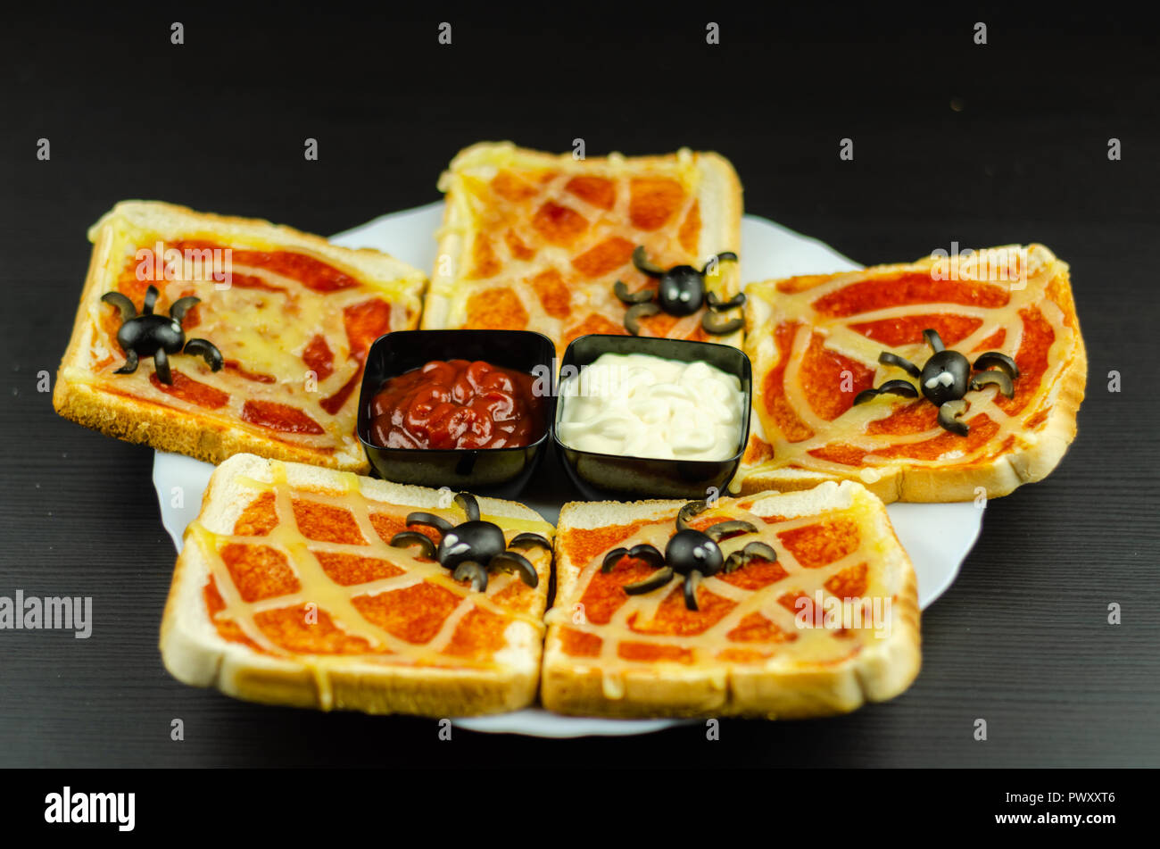 Funny sandwiches with spider and spider web for Halloween party, scary ...