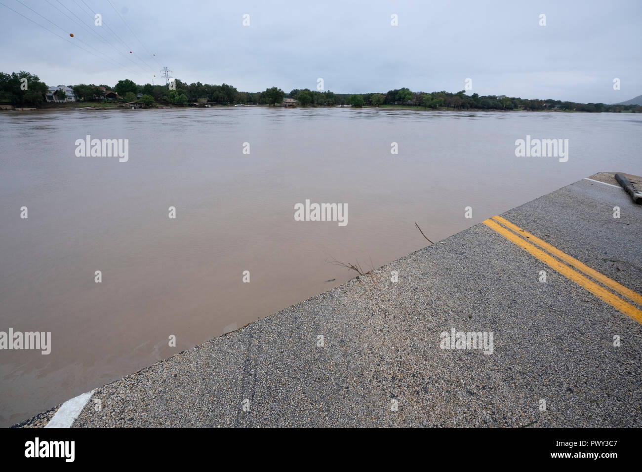 A 1,000-foot span of the RR2900 bridge over the Llano River is washed ...