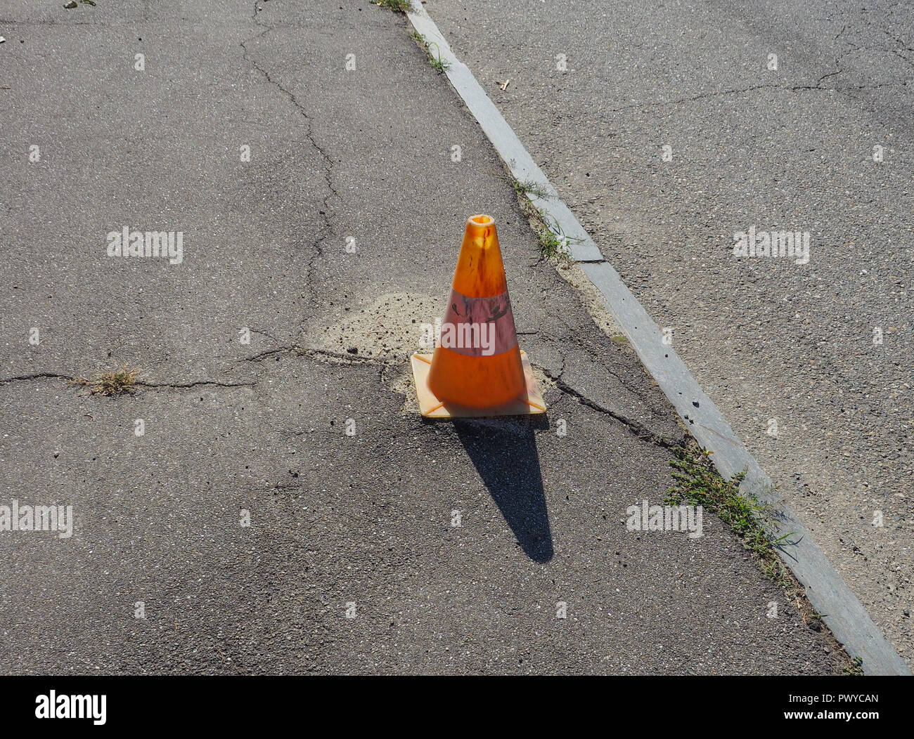 traffic cone to mark road works or temporary obstruction traffic sign ...