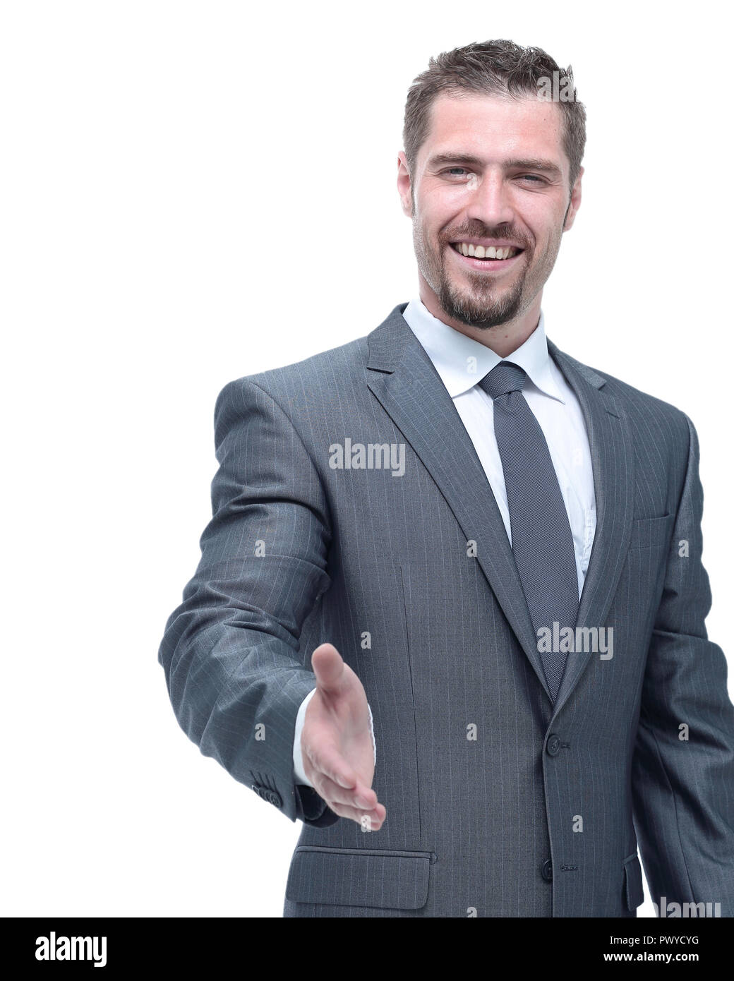 smiling businessman holds out his hand for a handshake Stock Photo - Alamy