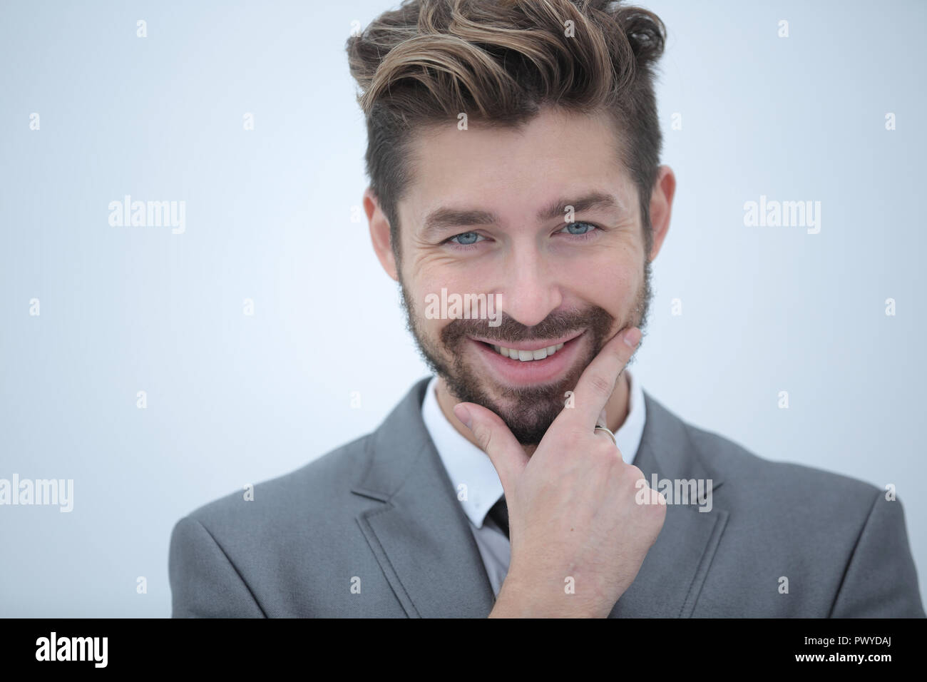 portrait of a man holding his hand on his chin Stock Photo - Alamy