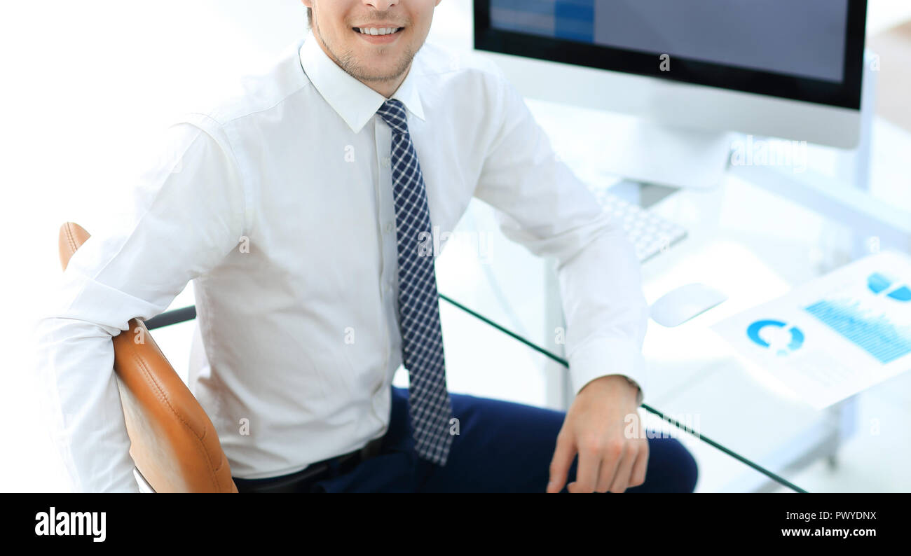employee sitting in front of a computer screen Stock Photo - Alamy