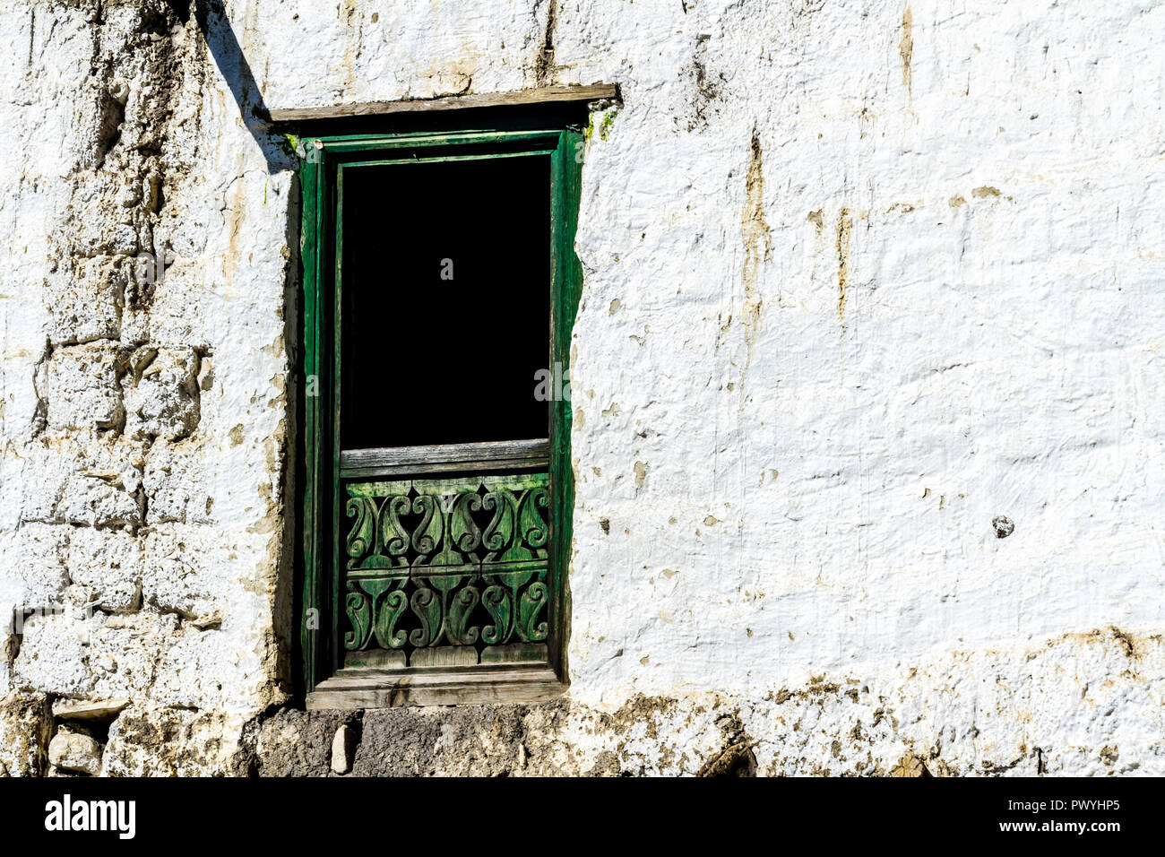 Old traditional wooden window a in small local village in Nepal ...