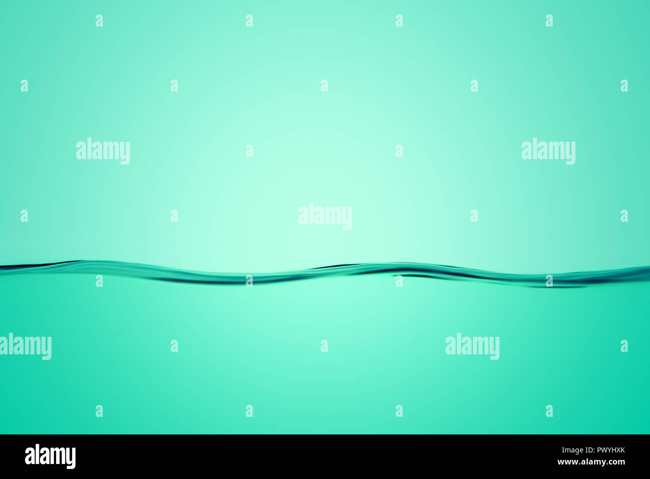 The surface of calm water in turquoise color. Close-up background Stock ...