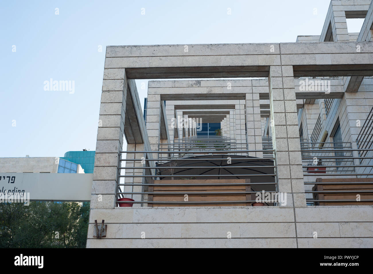 building with square windows, balcony Stock Photo - Alamy