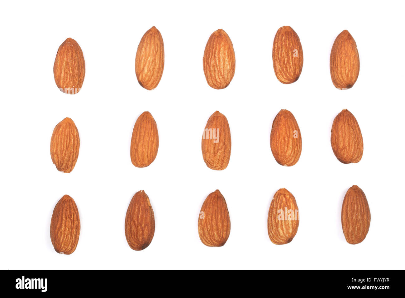 almonds isolated on white background. Flat lay pattern. Set or ...