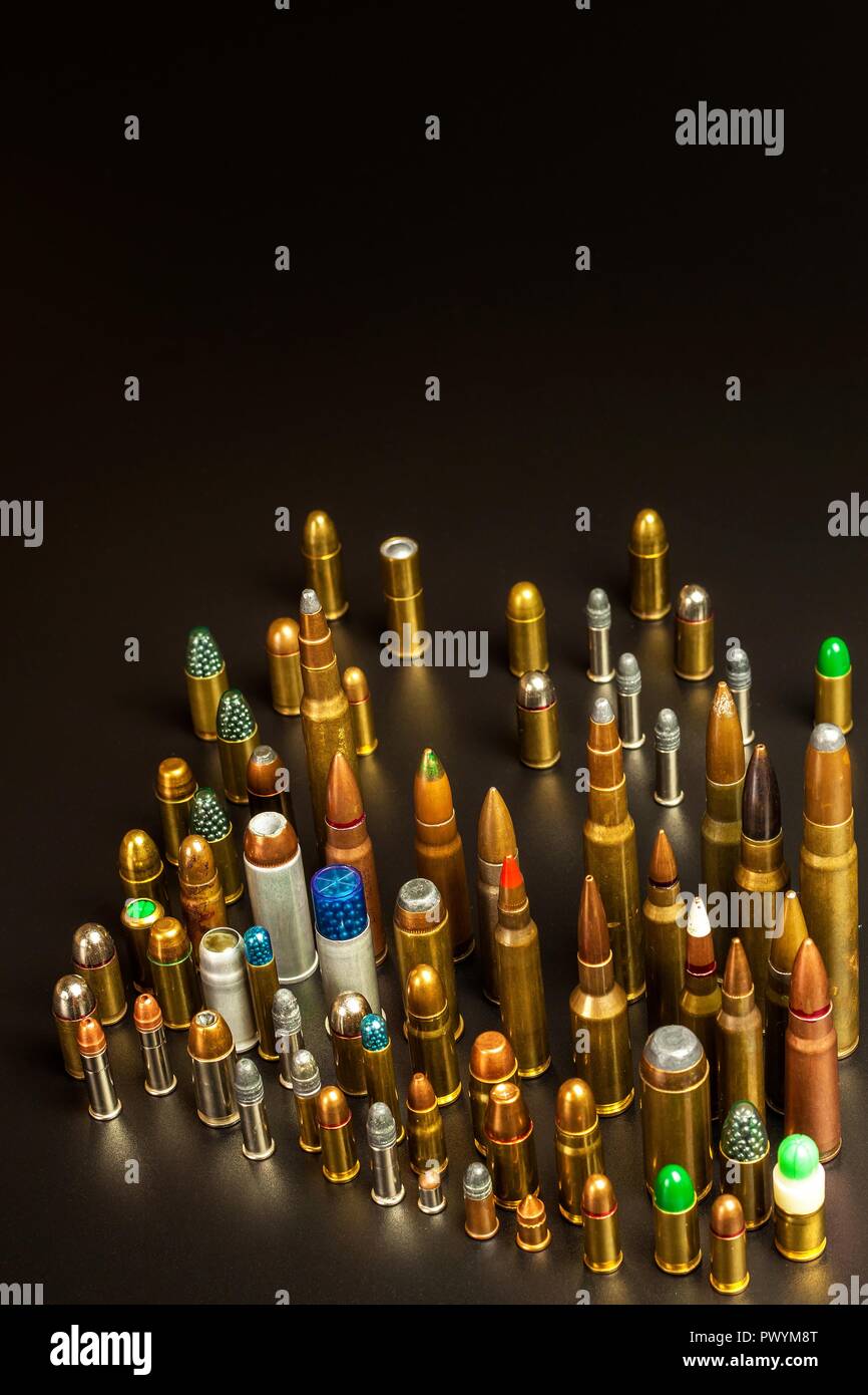 Medieval knight and modern ammunition. Different types of ammunition on ...