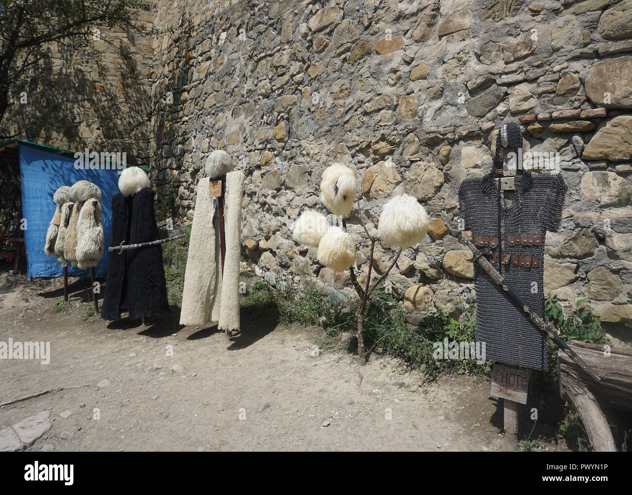 Georgian Traditional Costume with White Papakha Hats and Swords Stock ...