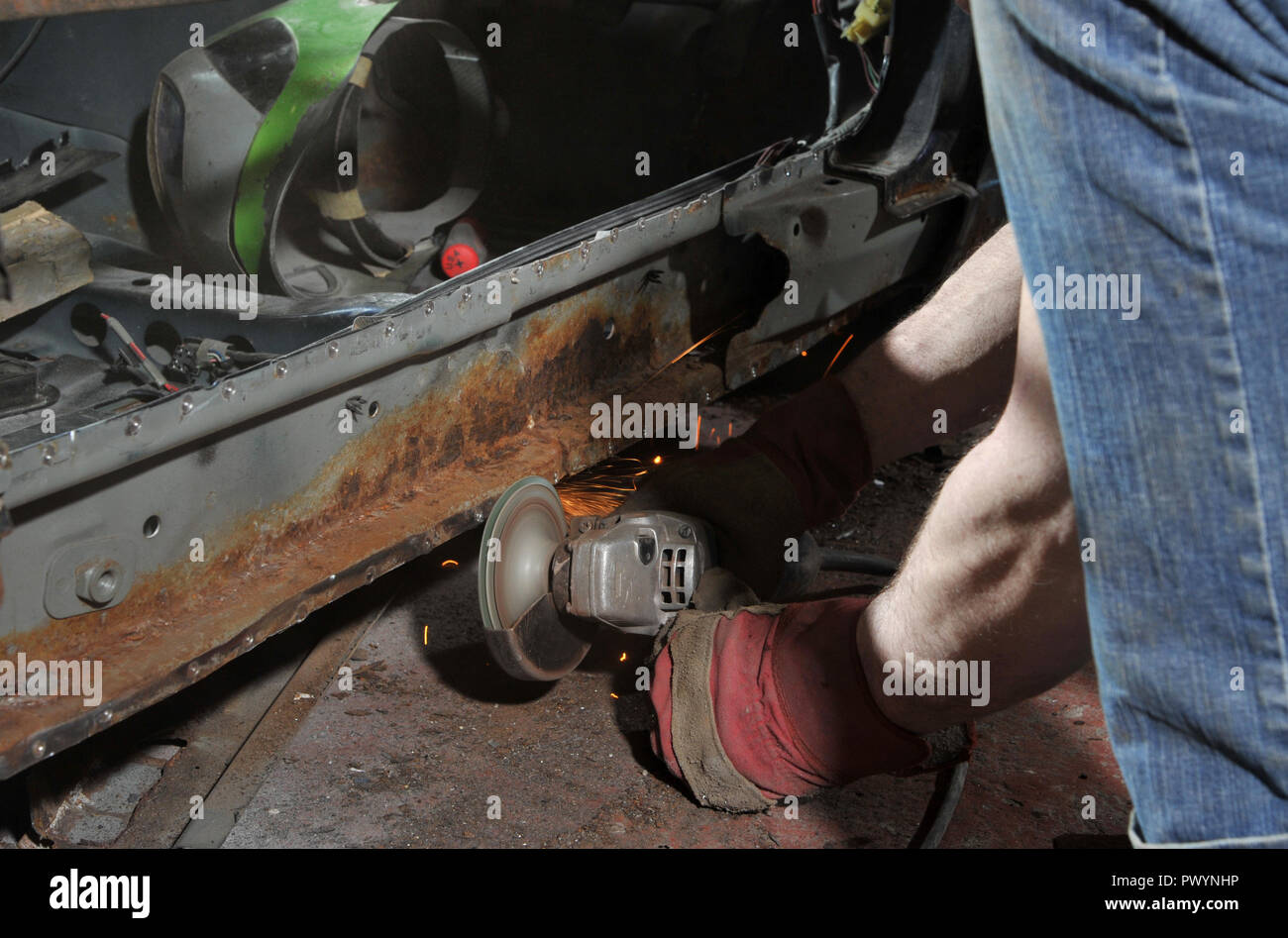 Cutting out old metal with a grinder - rust repairs to a Mk1 MR2 ...
