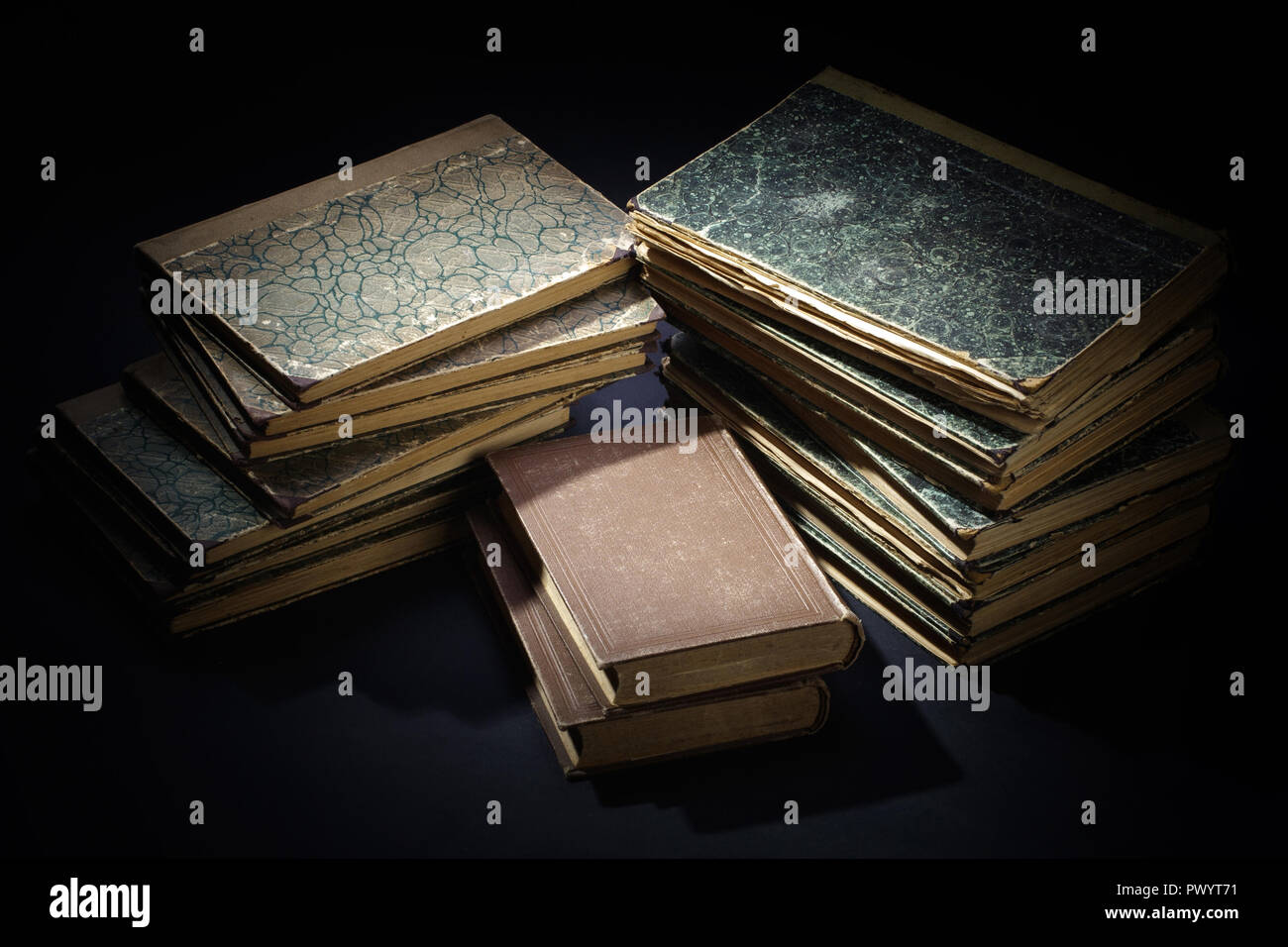 vintage concept - old books, papers, ink pen and inkpot on black ...