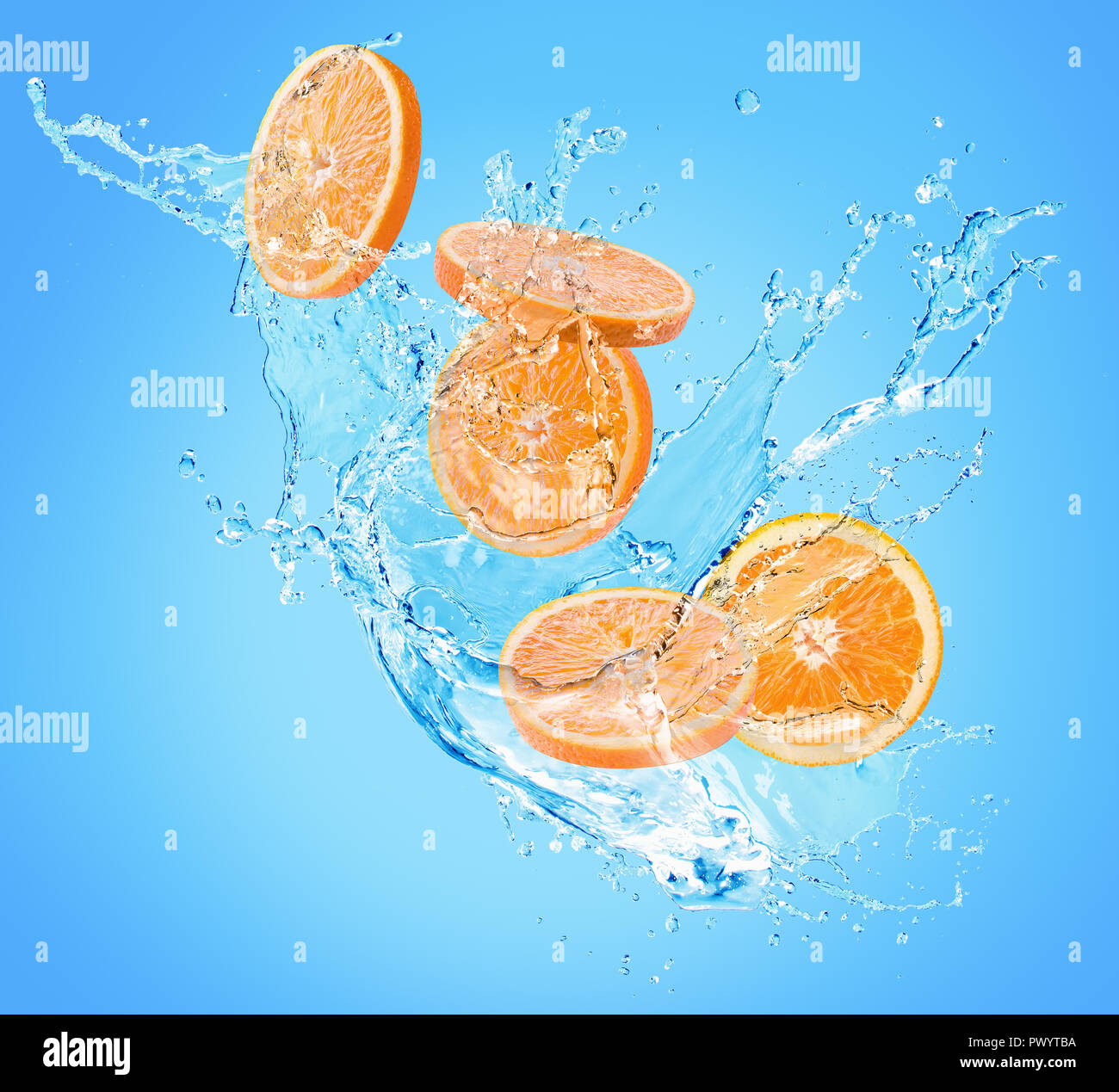 Orange slices falling splashing hi-res stock photography and images - Alamy