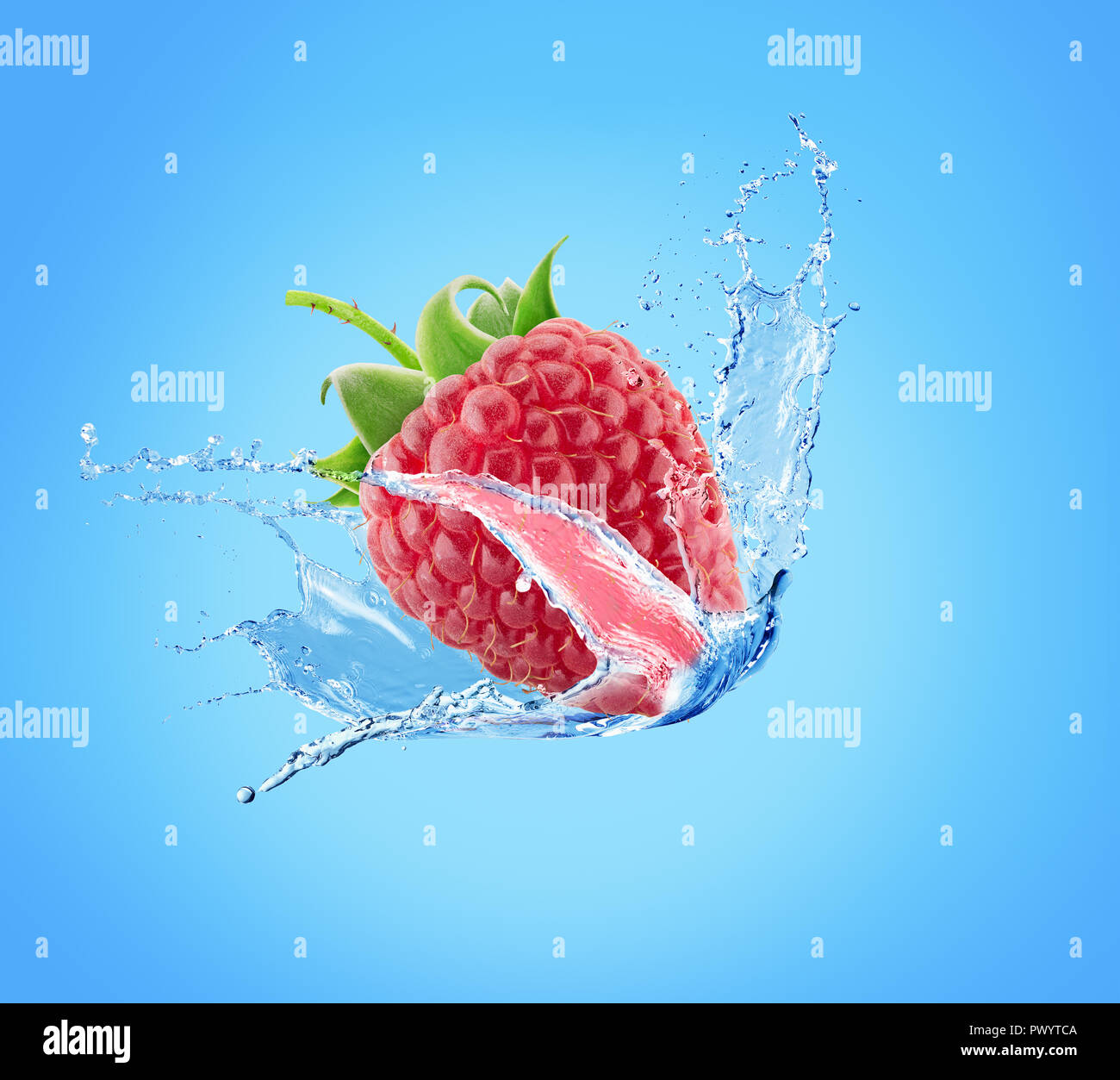 raspberry in water splash on a blue background Stock Photo - Alamy