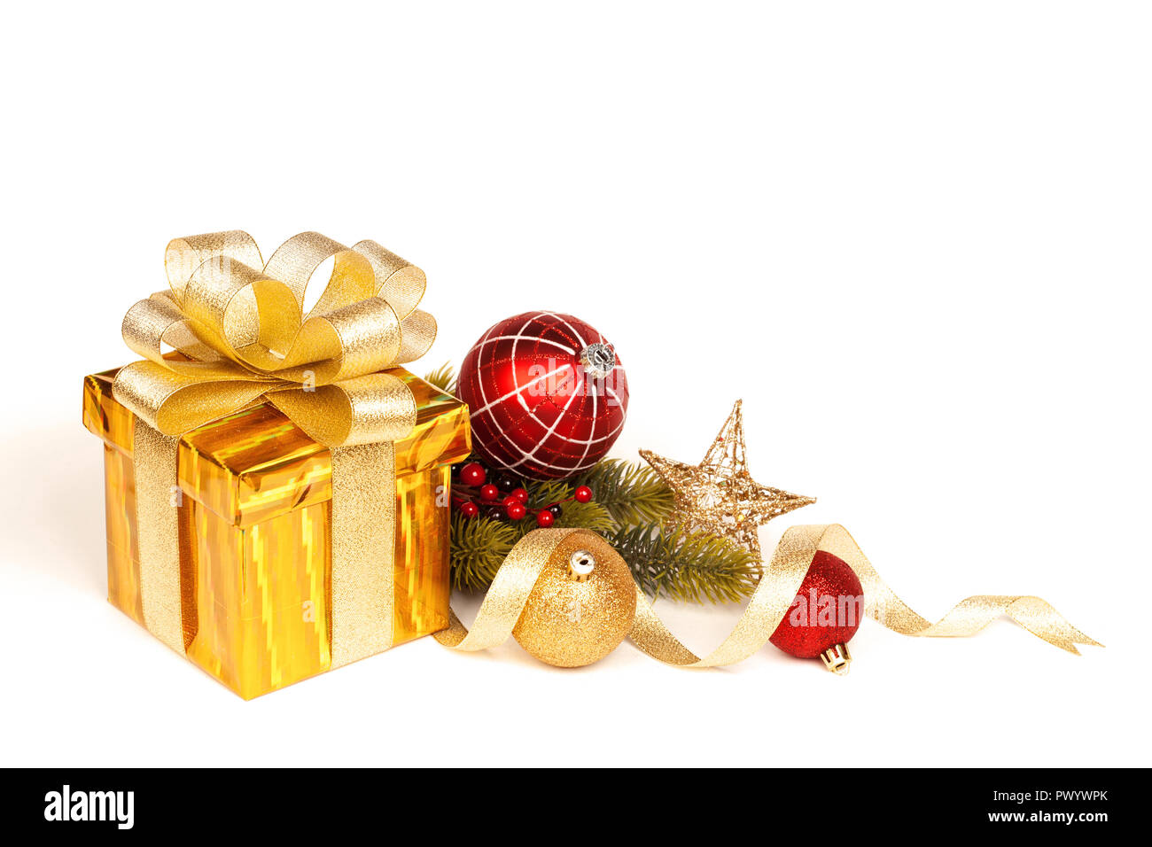 Christmas gold gift box isolated on white background Stock Photo - Alamy