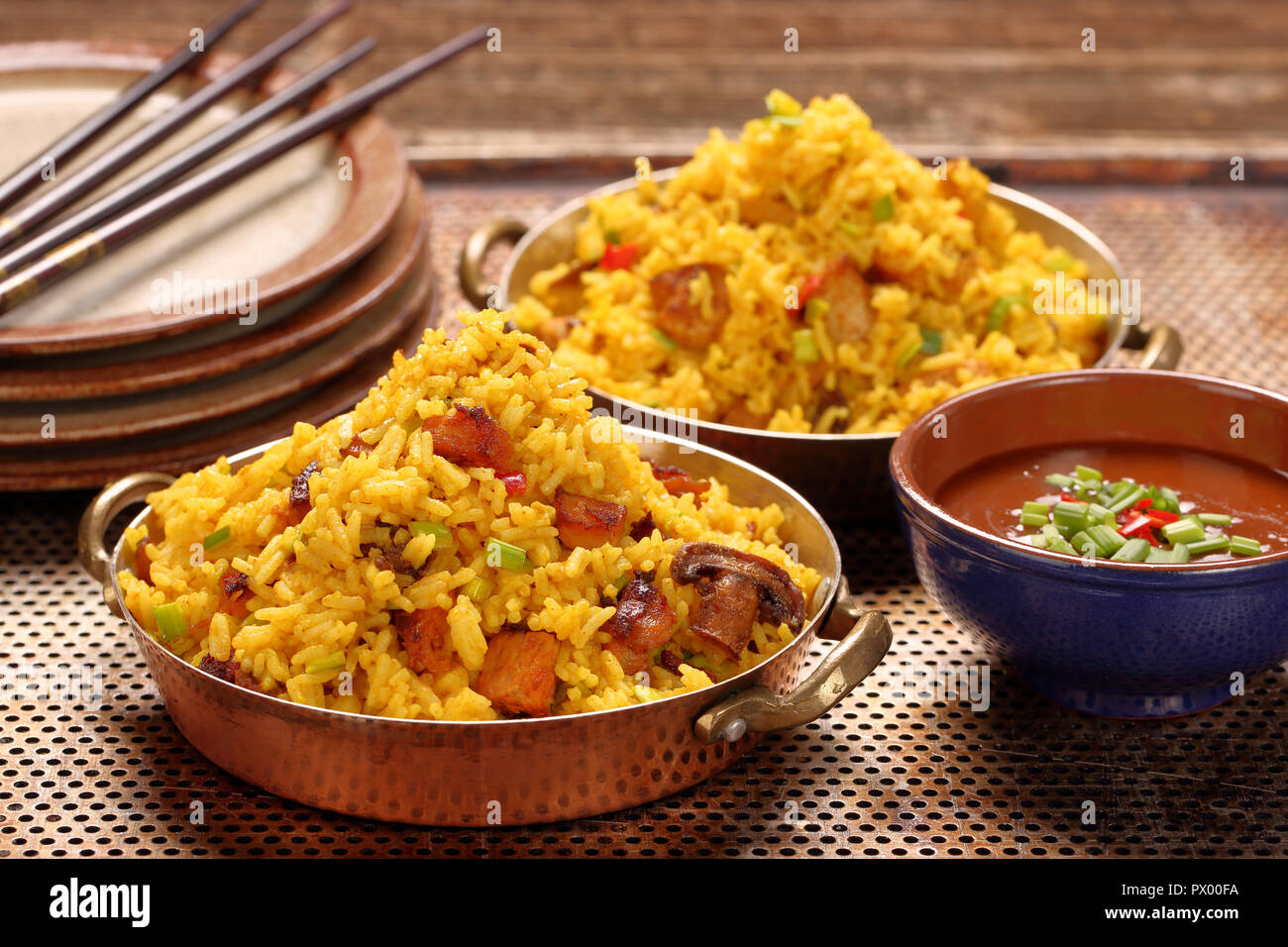 Chicken with basmati rice fried in stainless pan Stock Photo - Alamy