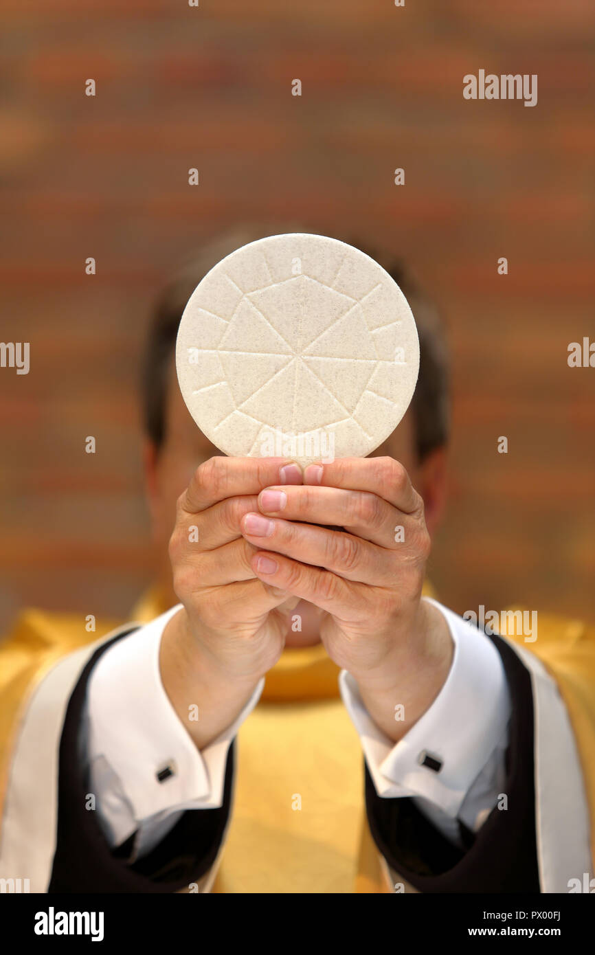 Priest celebrate mass at the church and empty place for text Stock ...