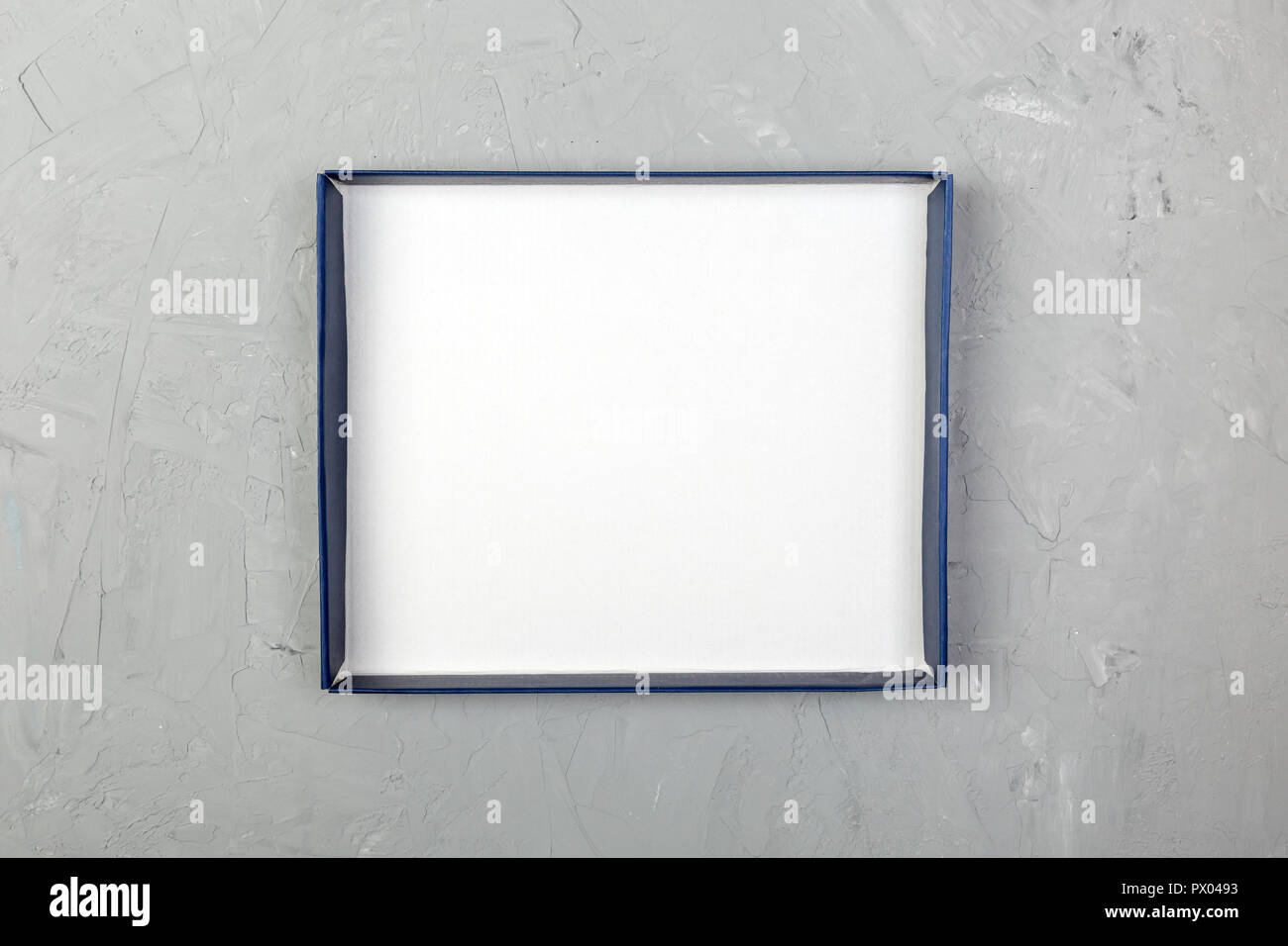 cardboard box on gray cement background surface. top view blank for you ...