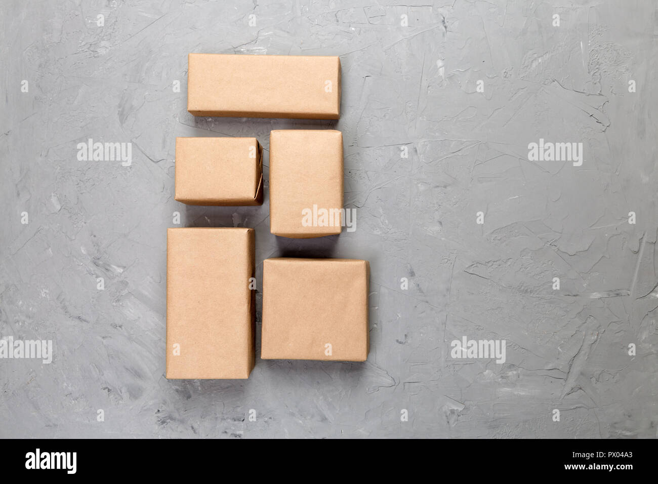 cardboard box on gray cement background, Brown mail package top view ...