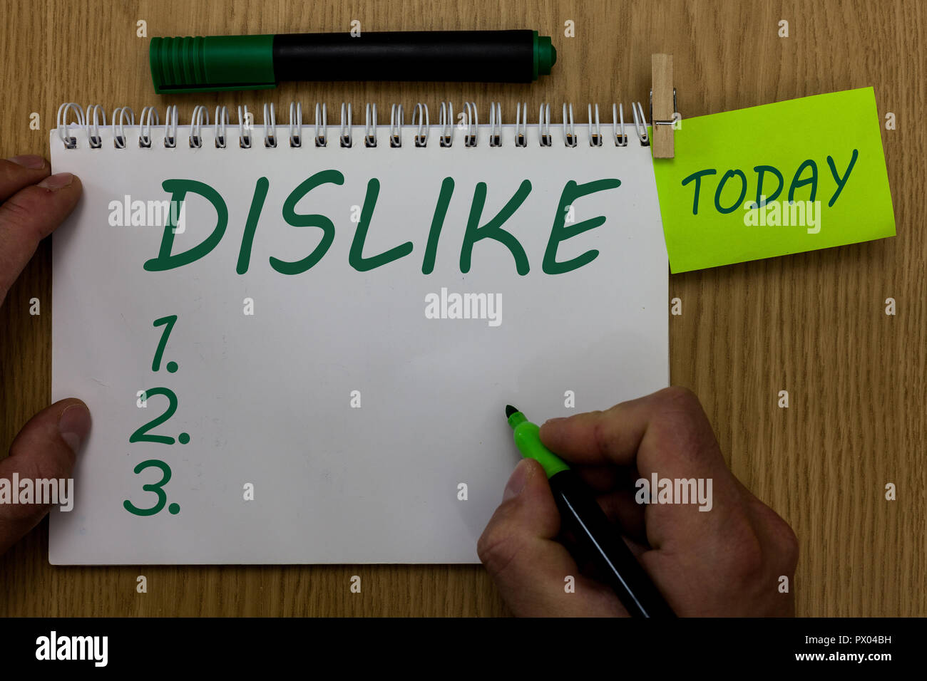 Holding thumbs down sign complaint hi-res stock photography and images ...