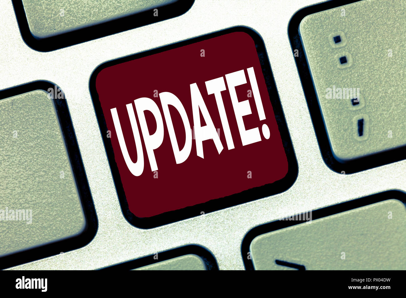 Conceptual hand writing showing UPDATE. Business photo showcasing Make something more modern ...