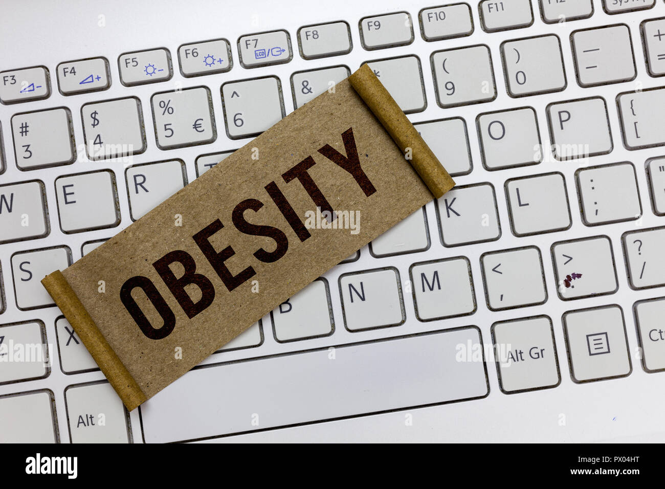 Handwriting text writing Obesity. Concept meaning Medical condition ...