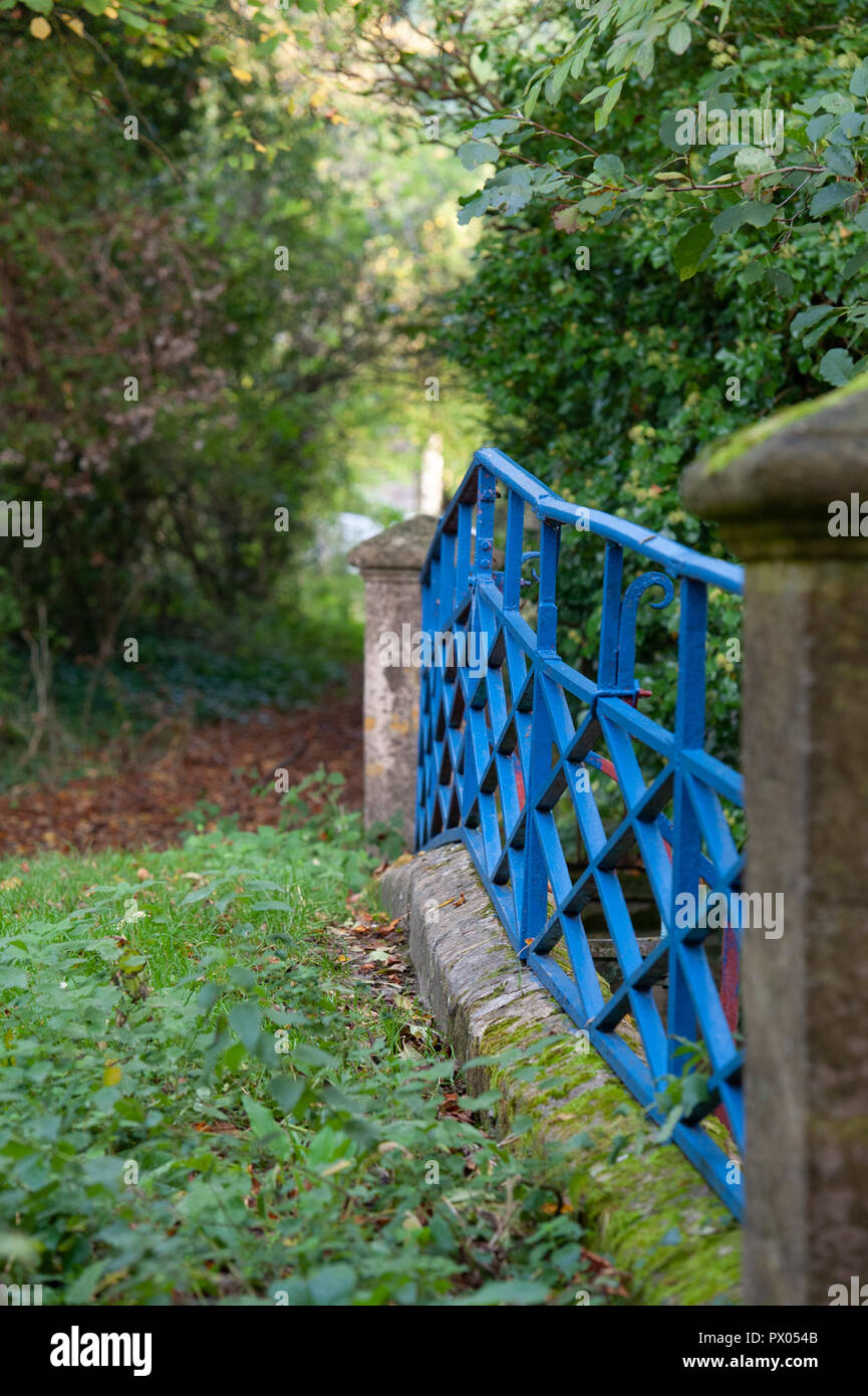 A blue painted bridge over the River Wylye near Bishopstrow, Warminster ...