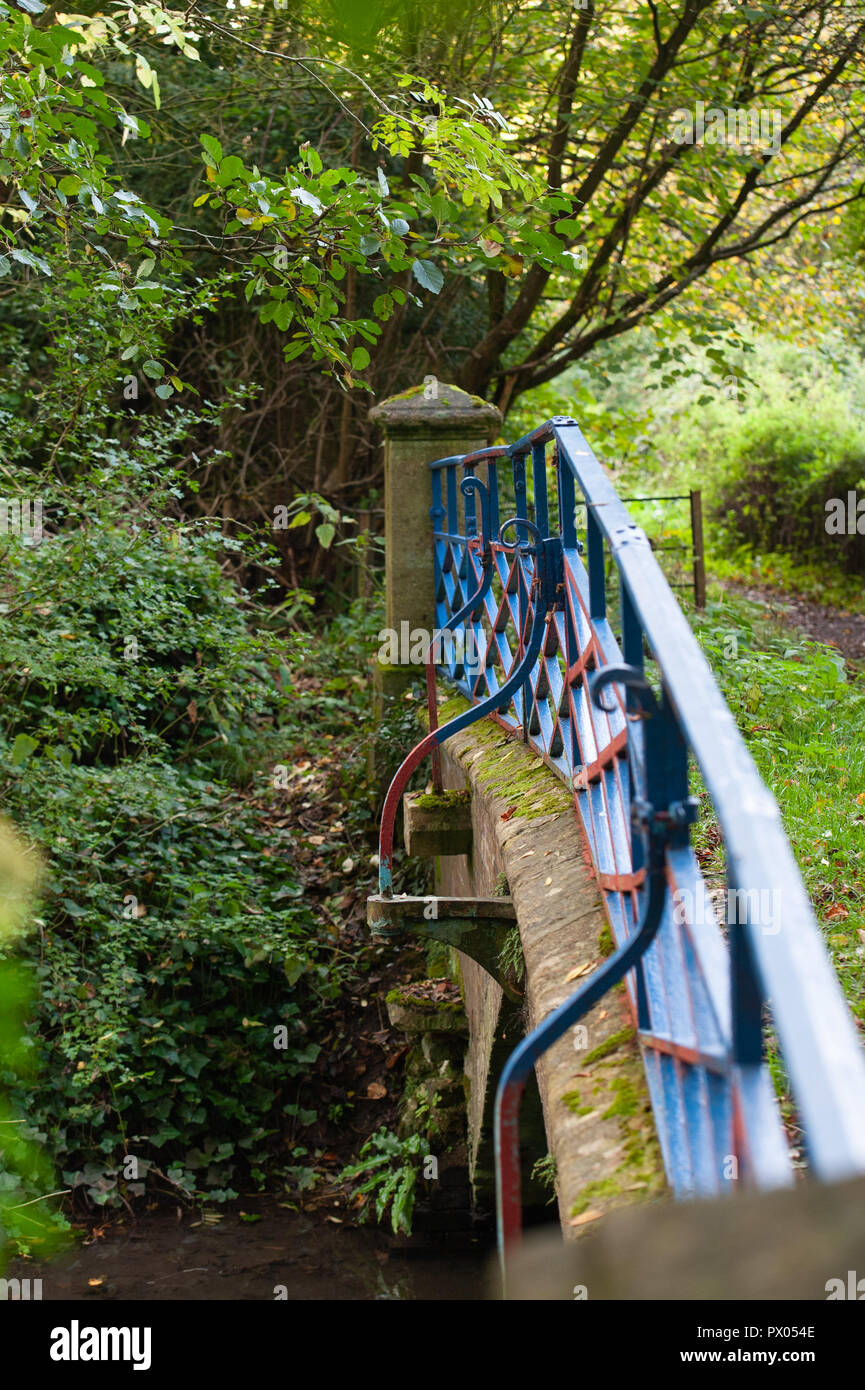 A blue painted bridge over the River Wylye near Bishopstrow, Warminster ...