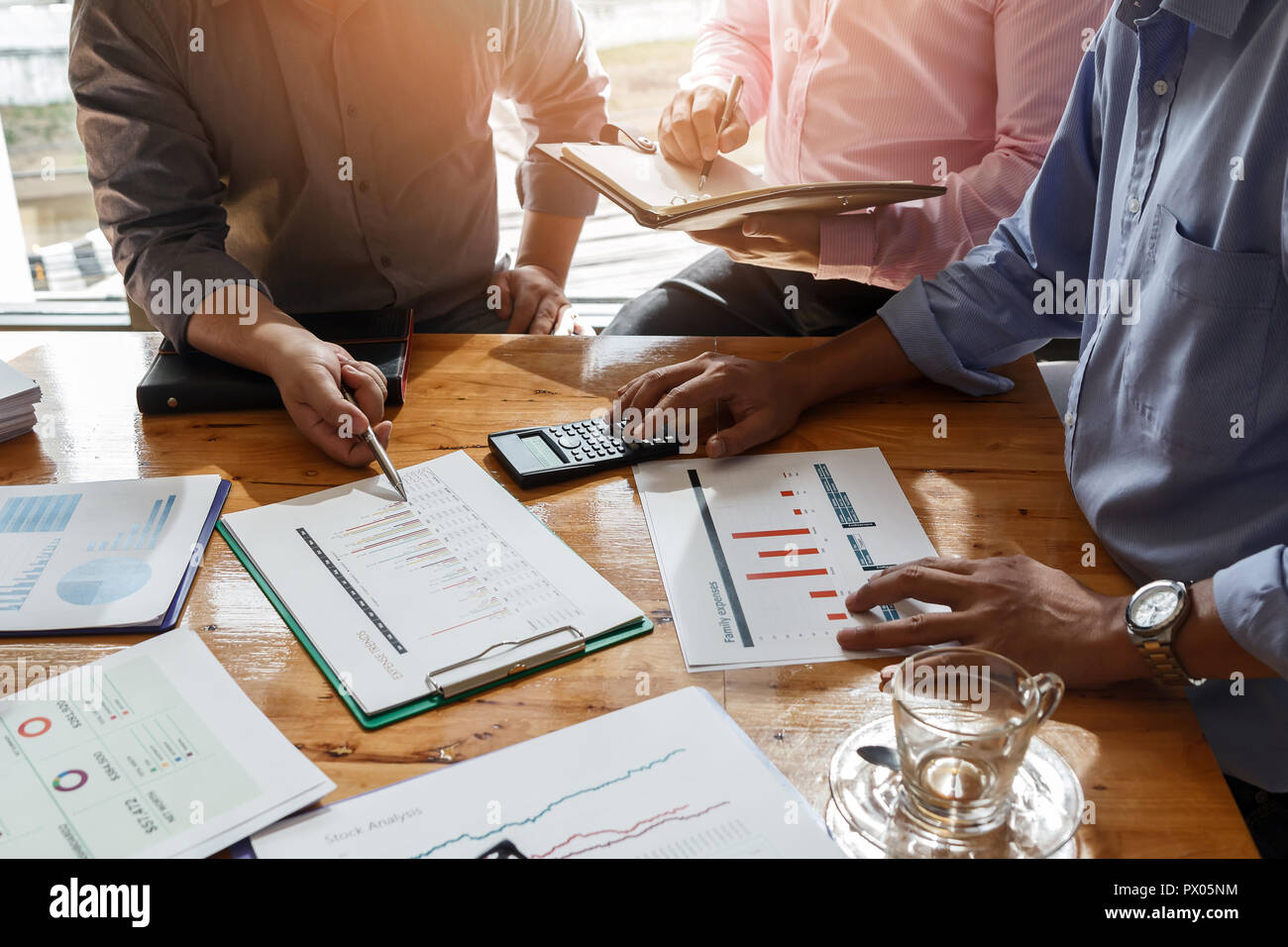 Business team meeting and discussing project plan. Businessmen ...