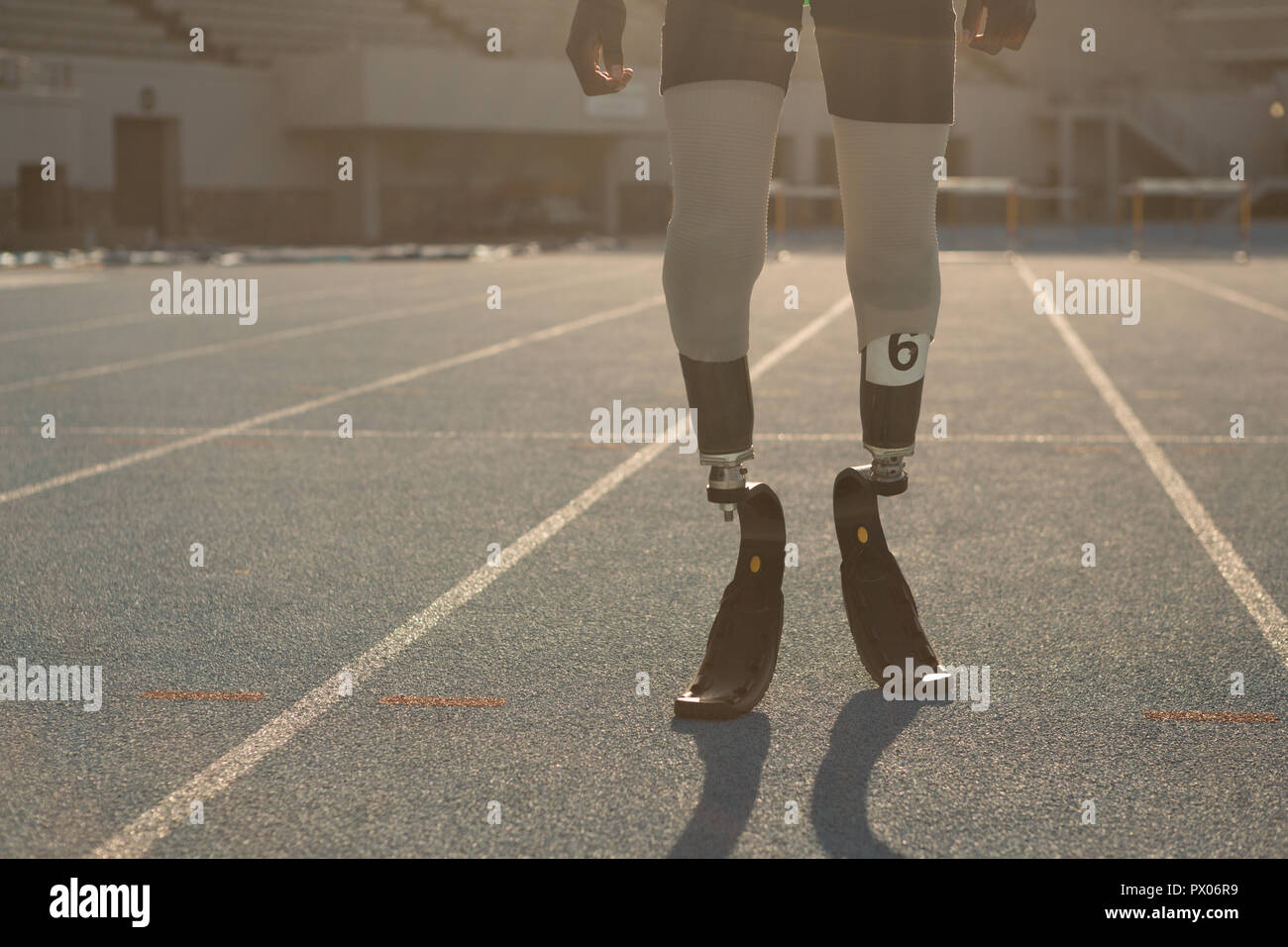 Disabled athletic standing on a running track Stock Photo - Alamy