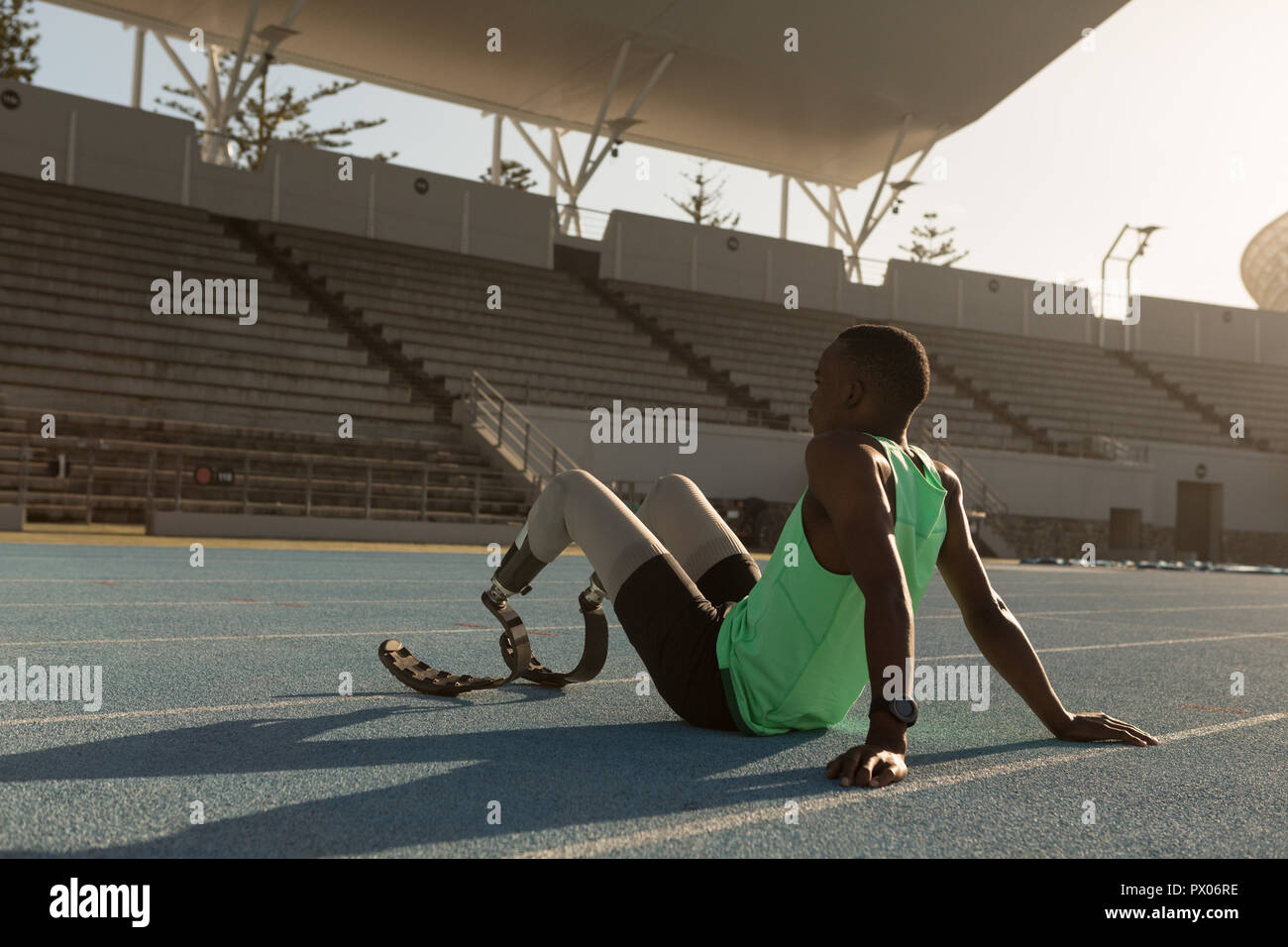 Disabled athletic relaxing on a running track Stock Photo - Alamy
