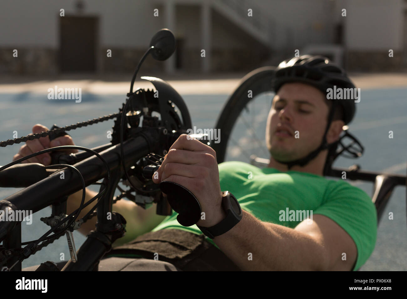 Disabled athlete racing in wheelchair Stock Photo - Alamy