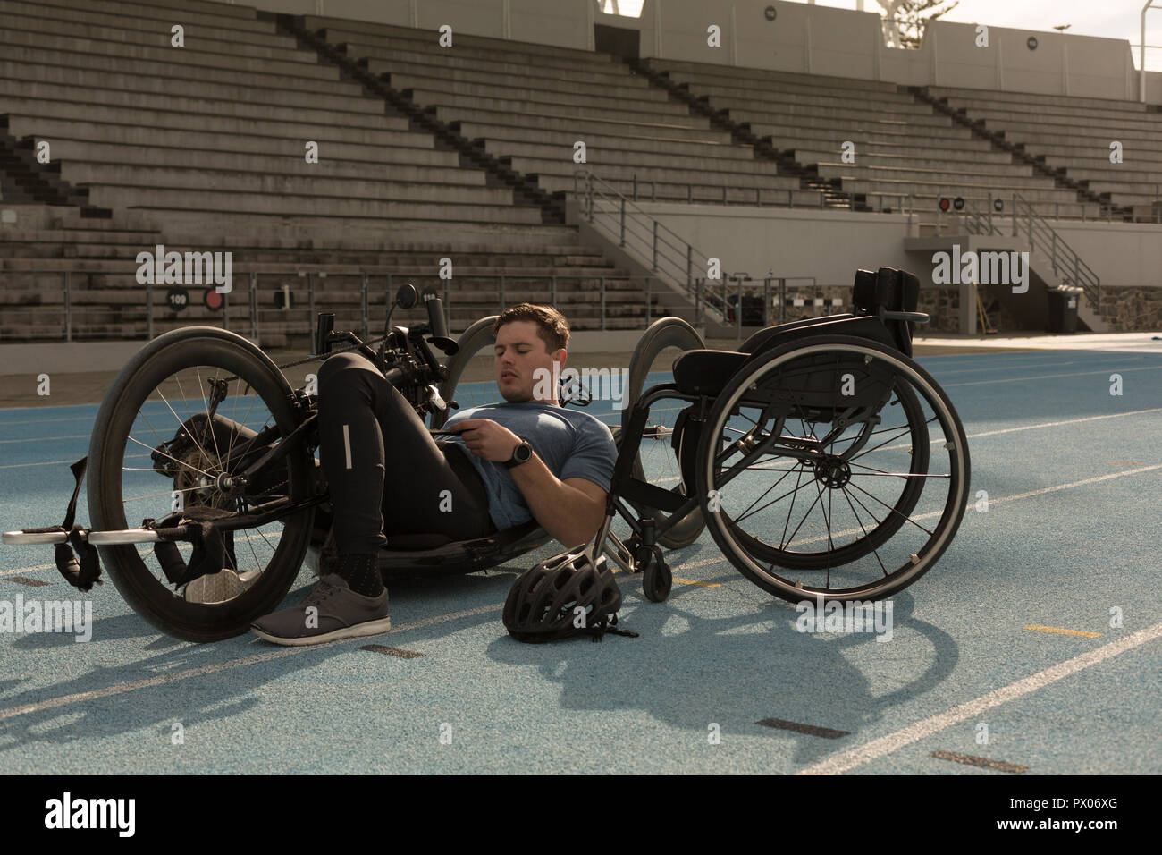 Disabled athletic with wheelchair on a racing track Stock Photo - Alamy