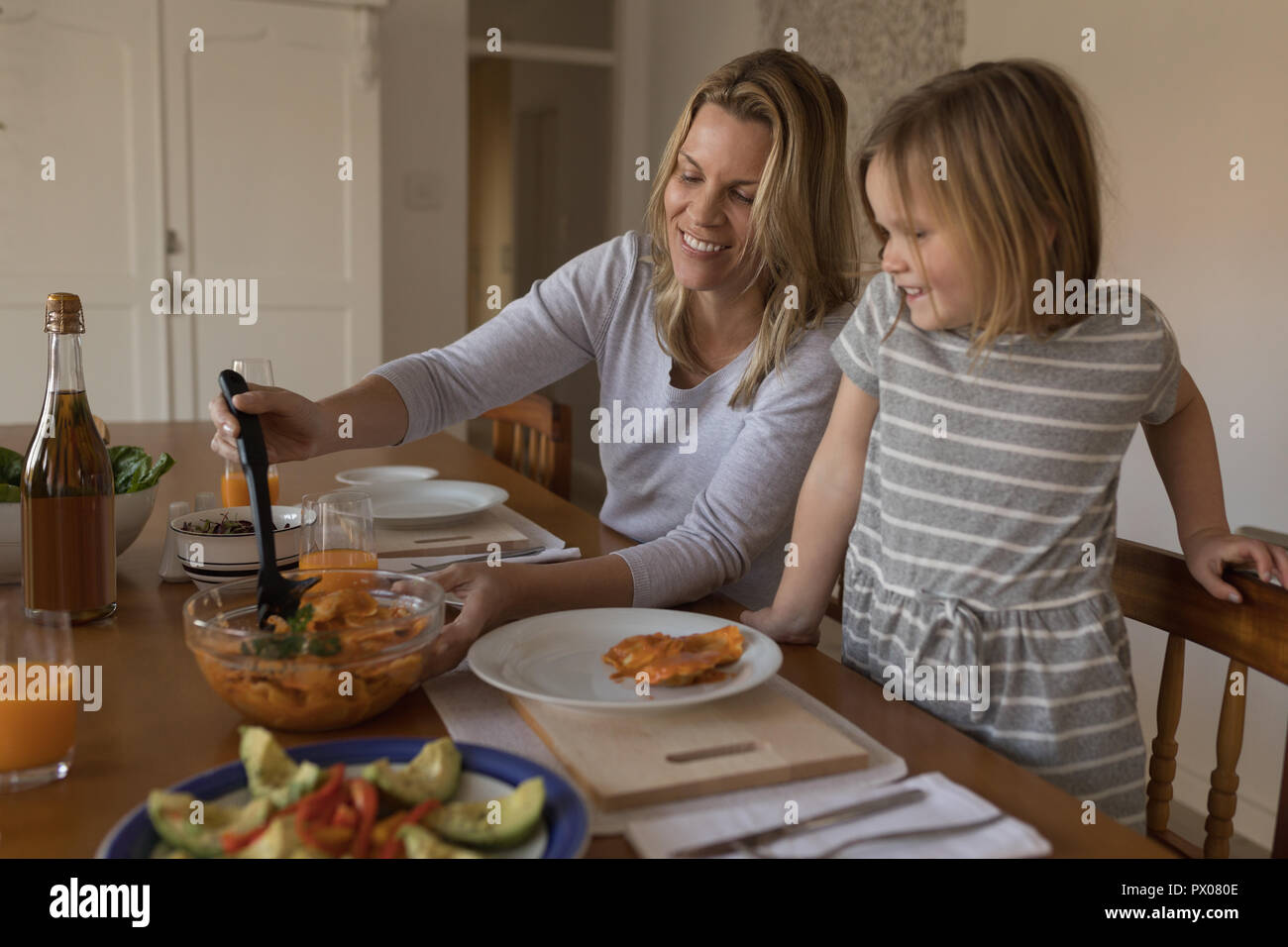 Child serving food hi-res stock photography and images - Alamy