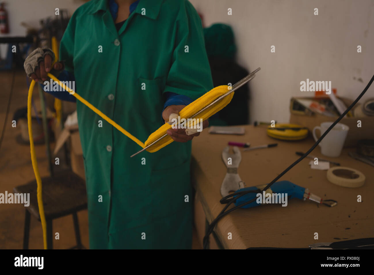 Worker working in rope making industry Stock Photo - Alamy