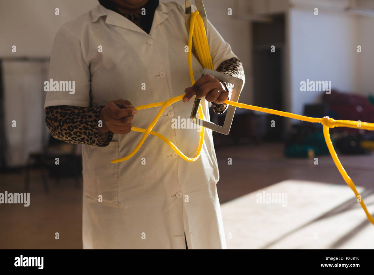 Worker working in rope making industry Stock Photo - Alamy