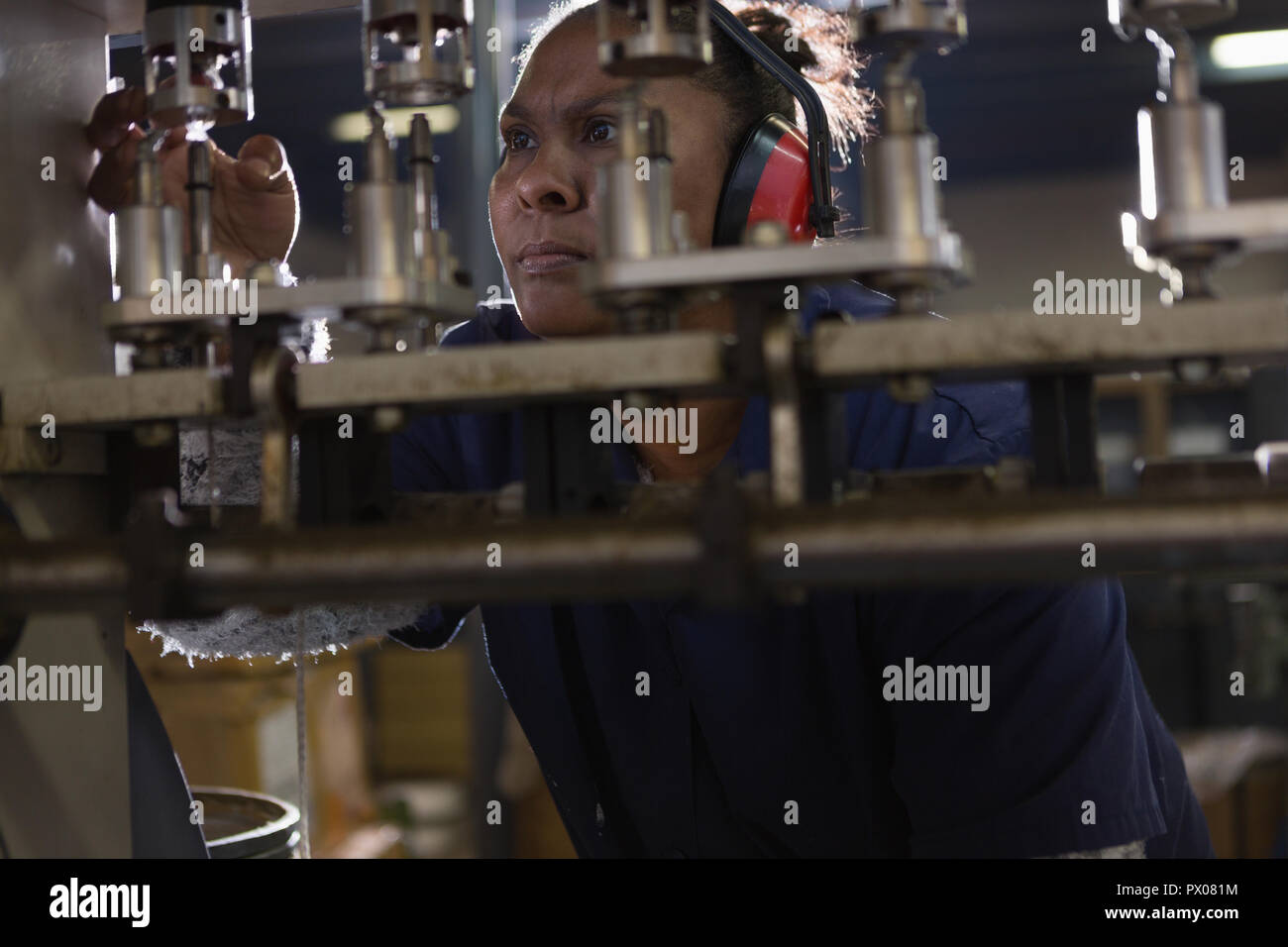 Worker working in rope making industry Stock Photo - Alamy